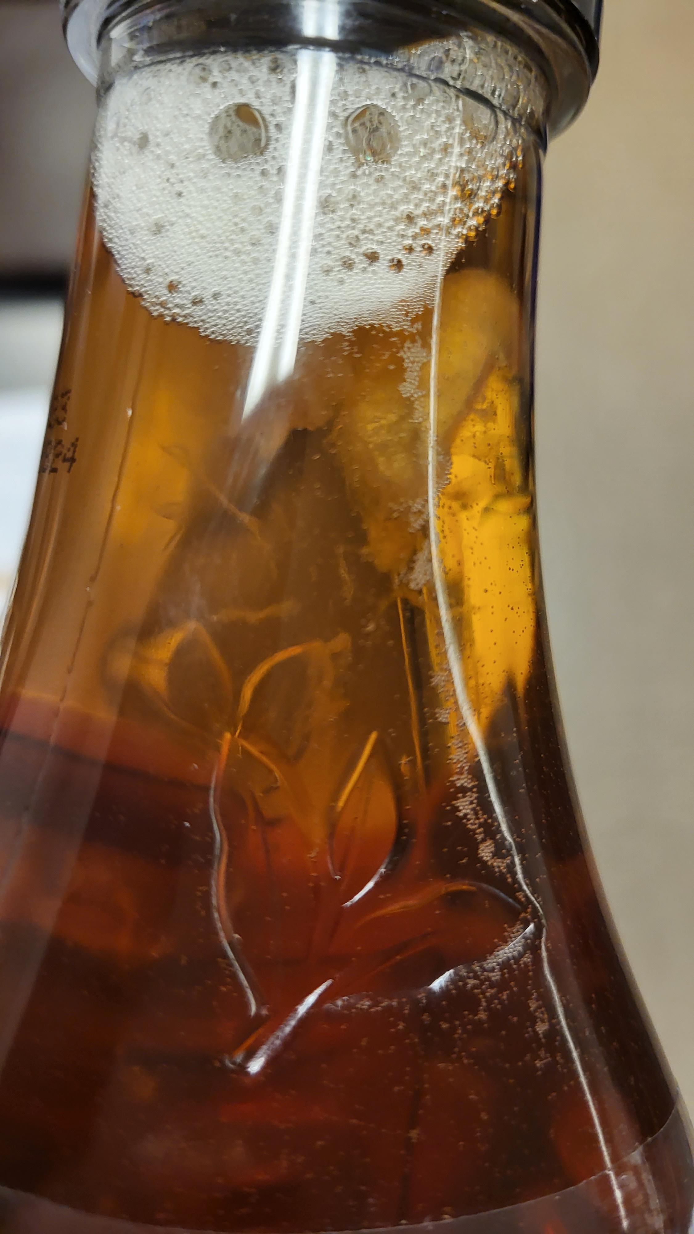 What is this white-flake floating in the tea? | Scrolller