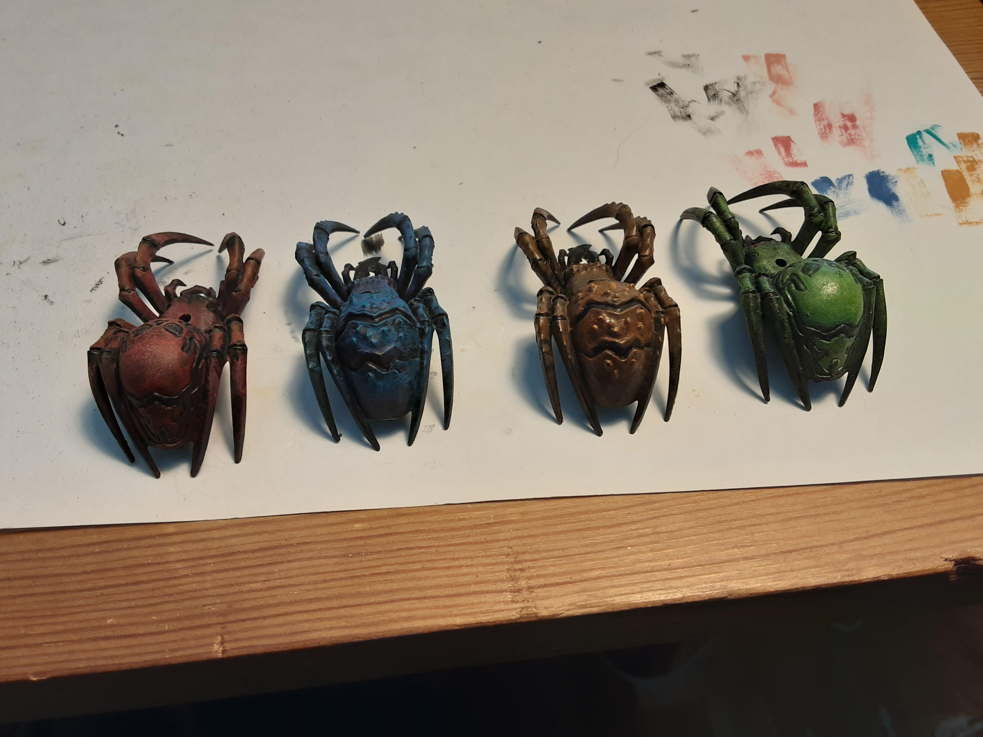 Four spiders; four colours | Scrolller