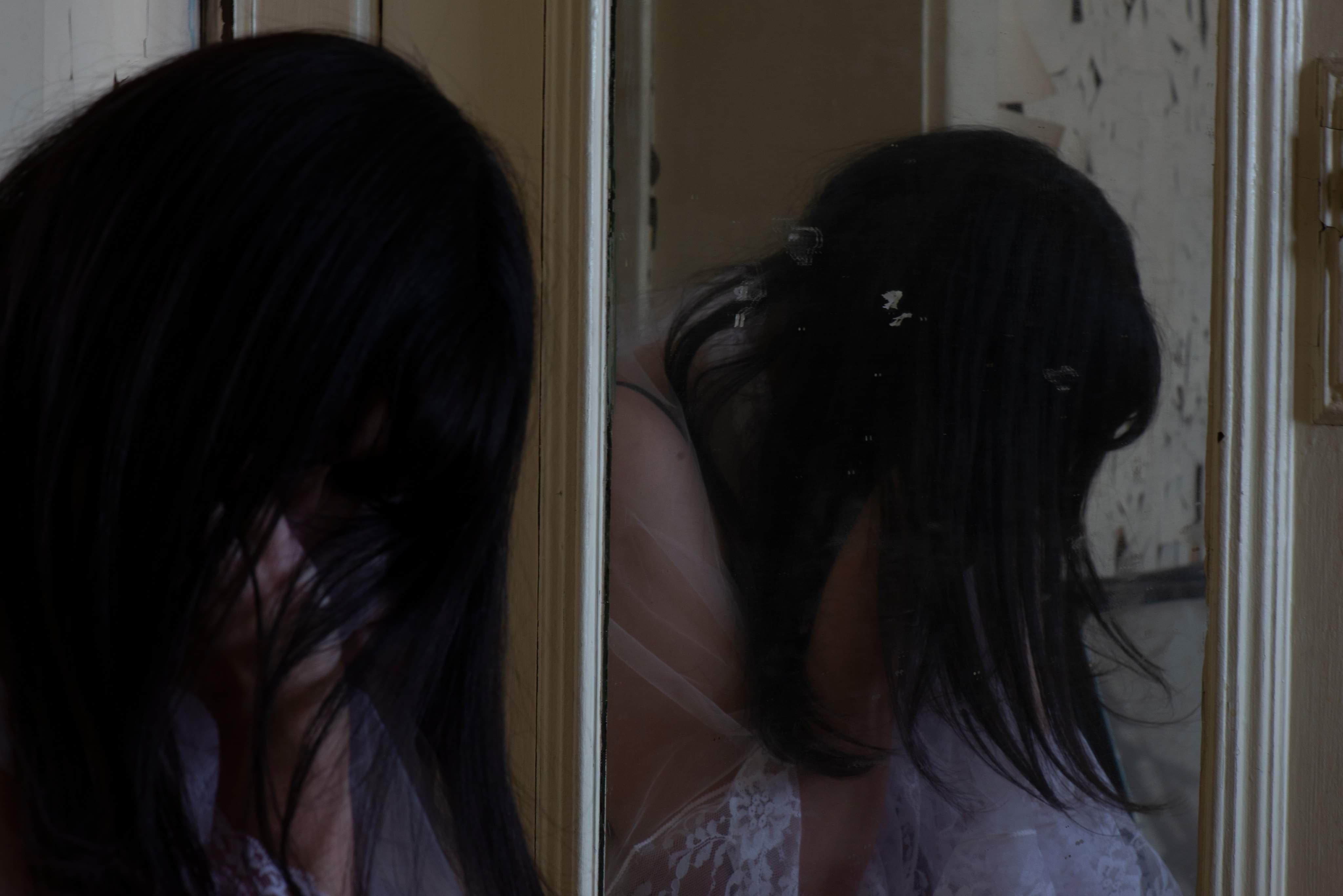 Photos taken at abandoned funeral parlor with my wife modeling with a funeral shroud. | Scrolller