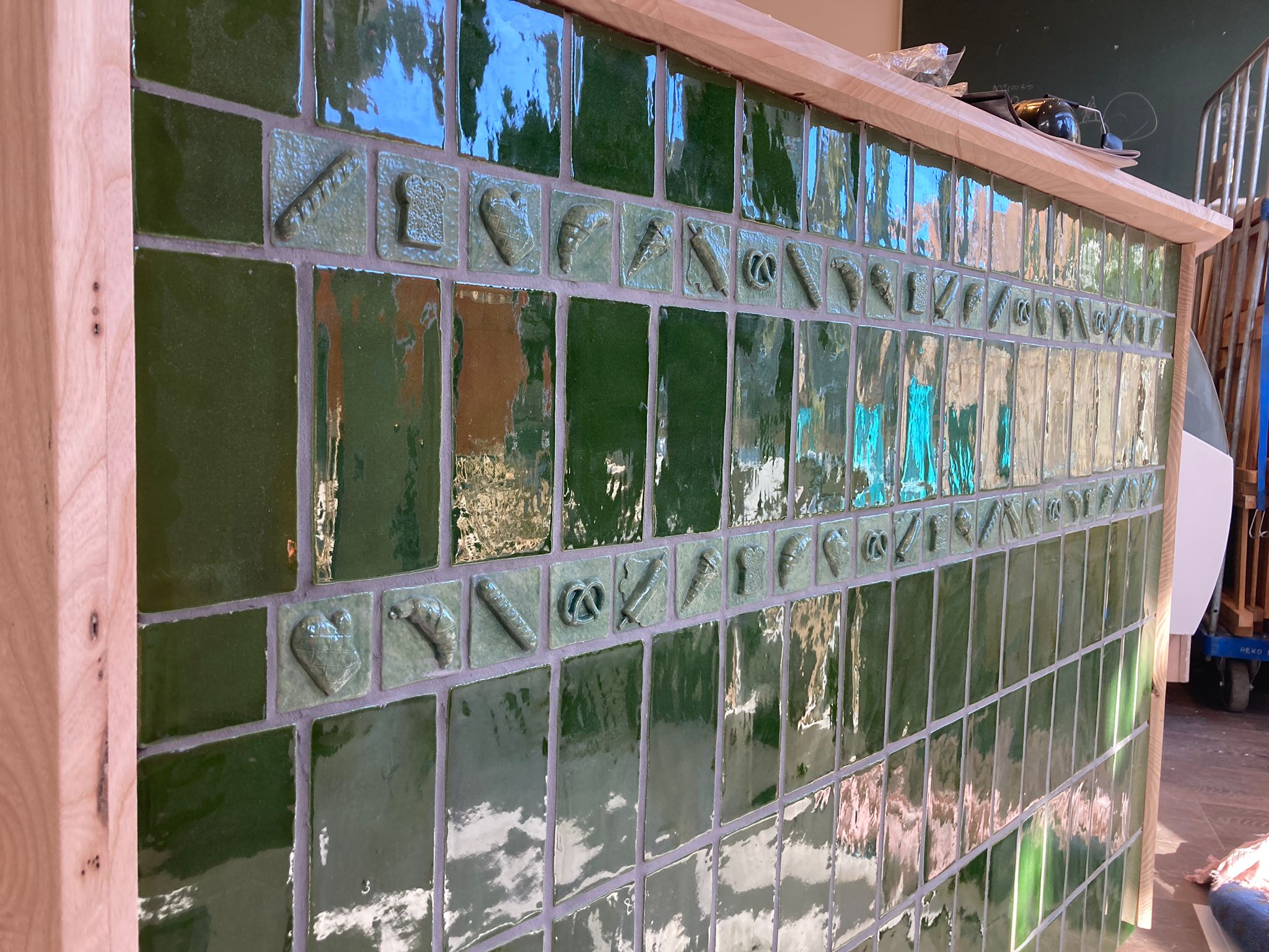 I made small ceramic relief tiles for a bakery that is opening next week. | Scrolller