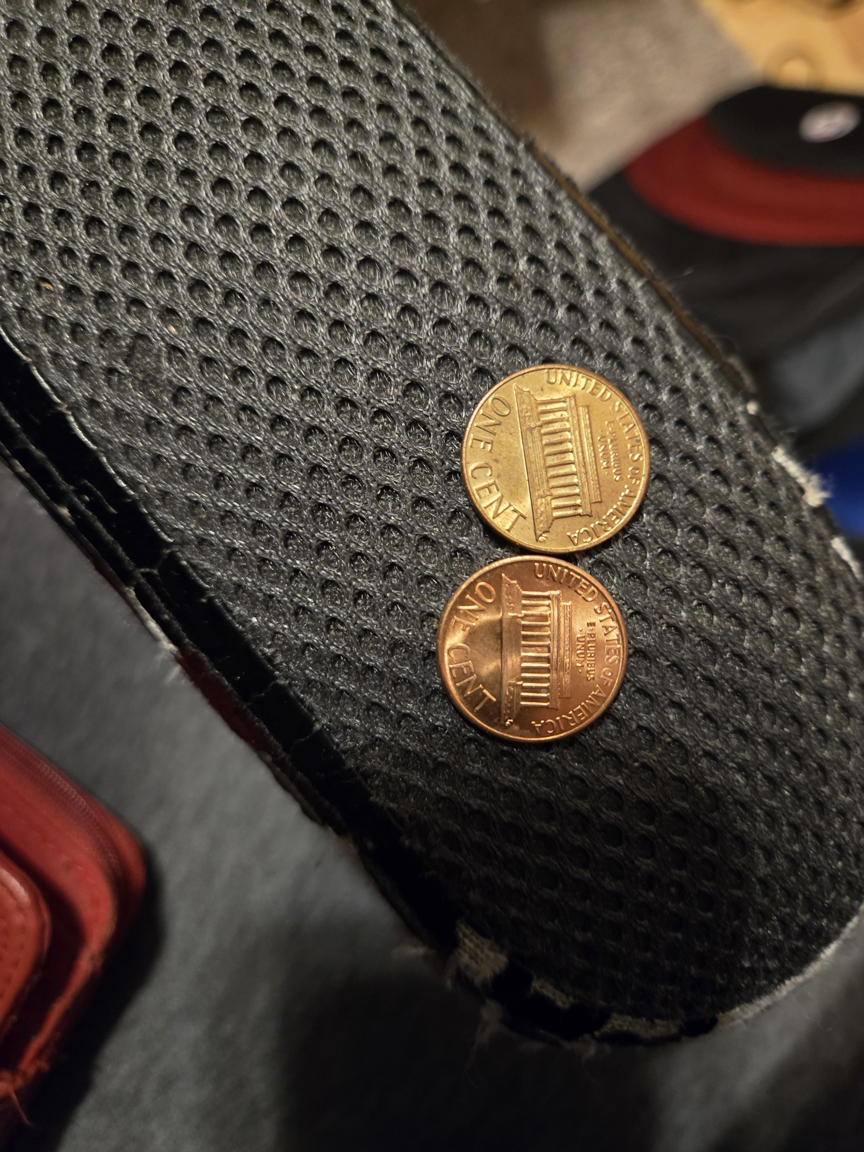 Can anyone tell me why the coin on top has this yellowish gold tone. | Scrolller