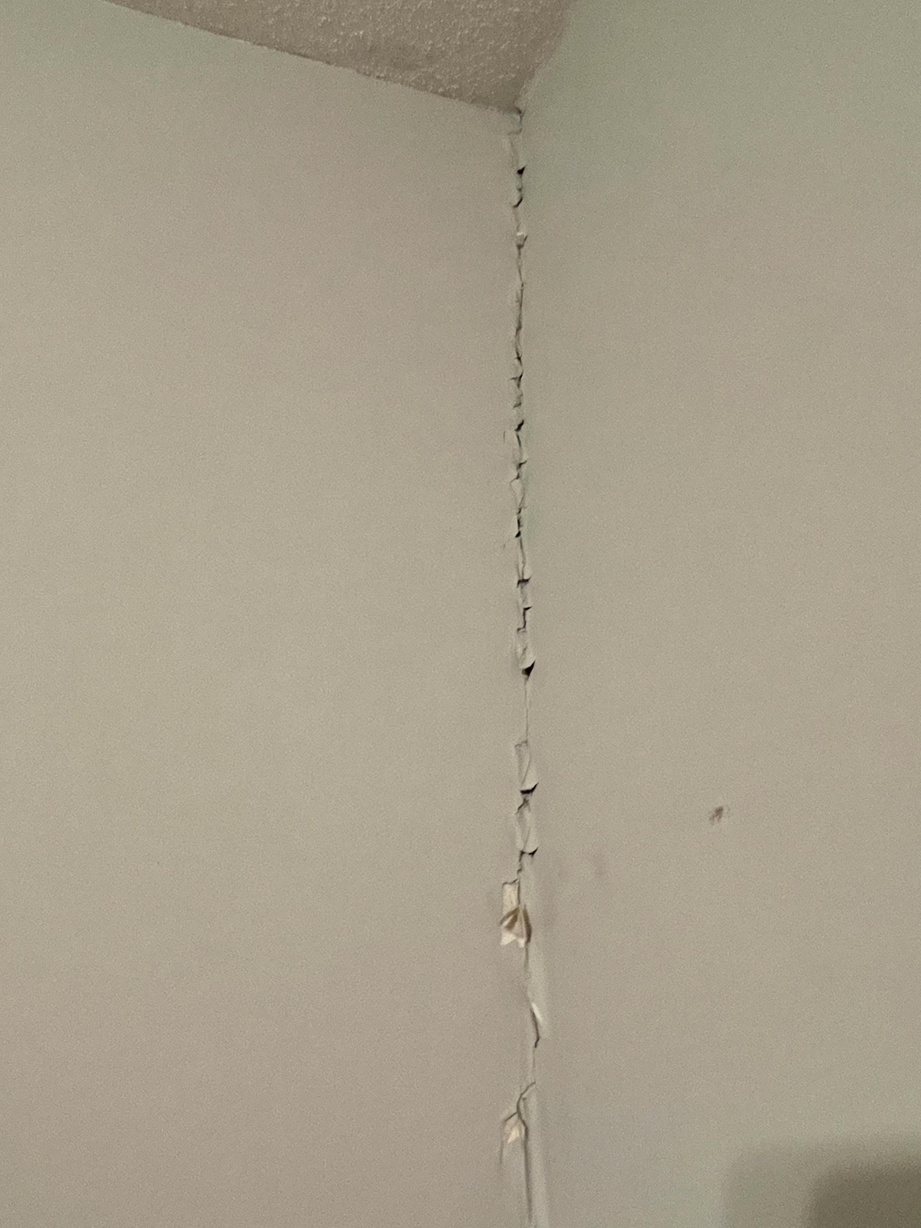 How do I fix this split in the corner? I think it’s old drywall tape that’s been painted over ...