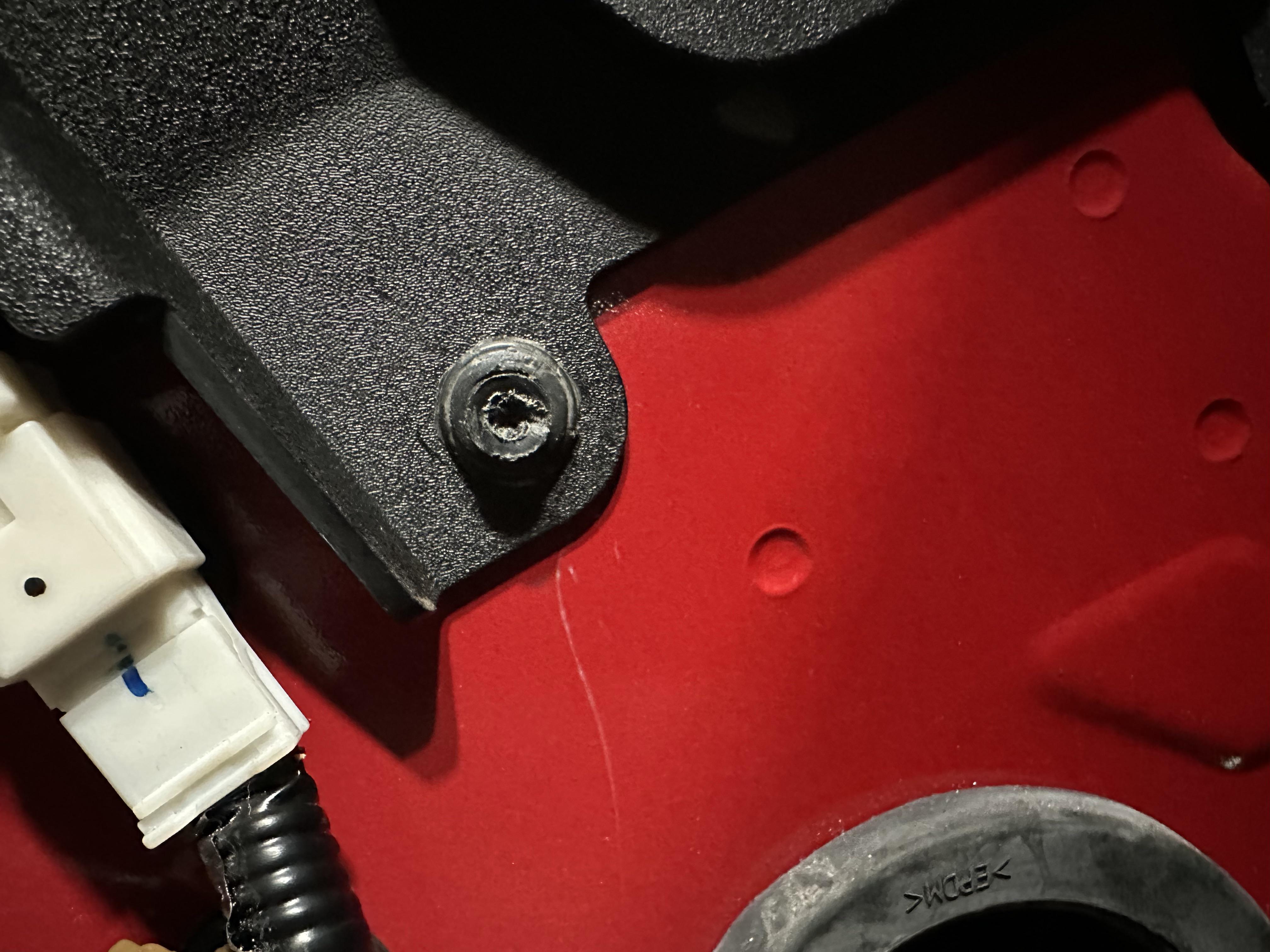 How do I remove this stripped screw | Scrolller