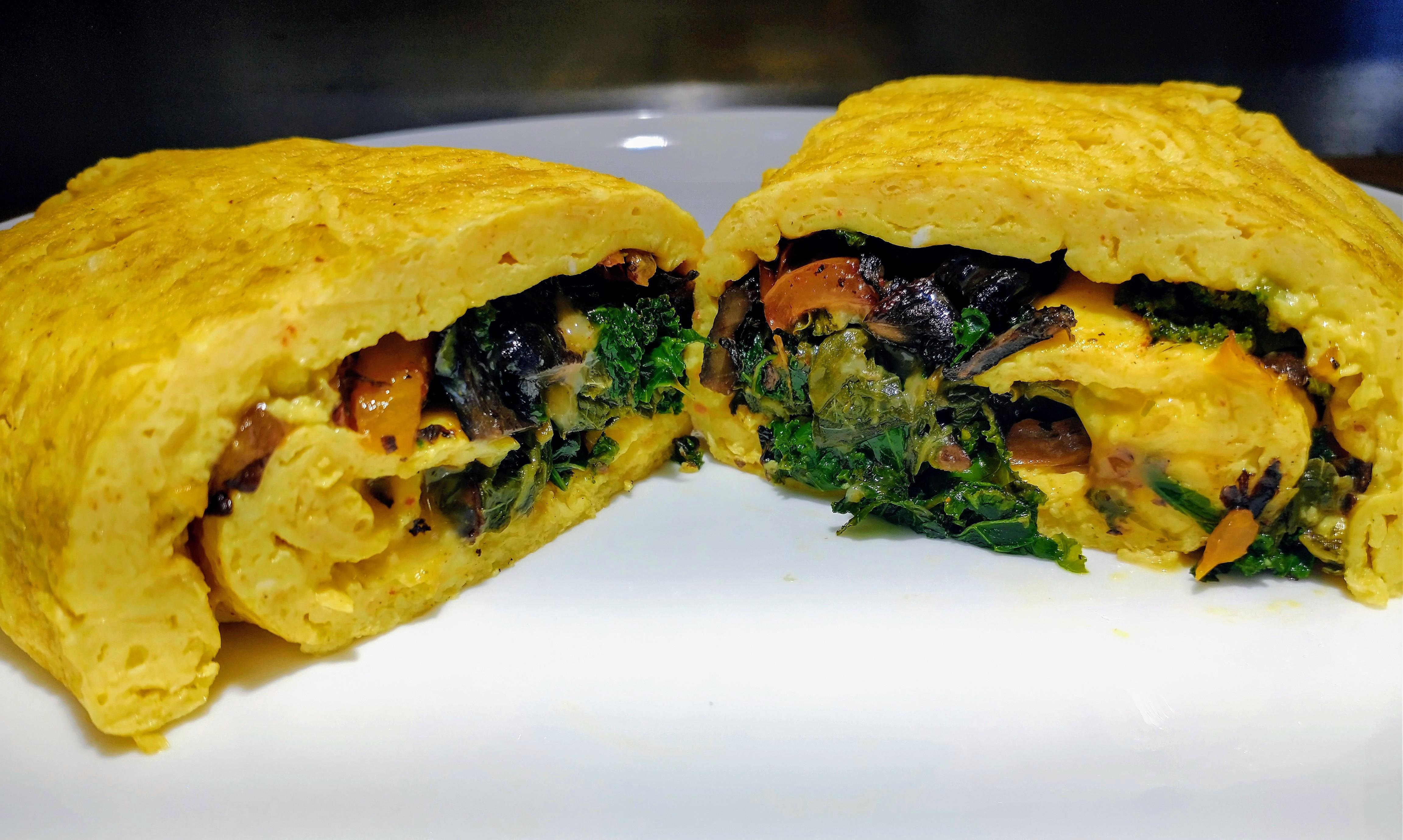 [homemade] "Seven in Heaven Omelette" - 7 Eggs, Dry Roasted Mushroom, Sautéed Kale and Bell ...