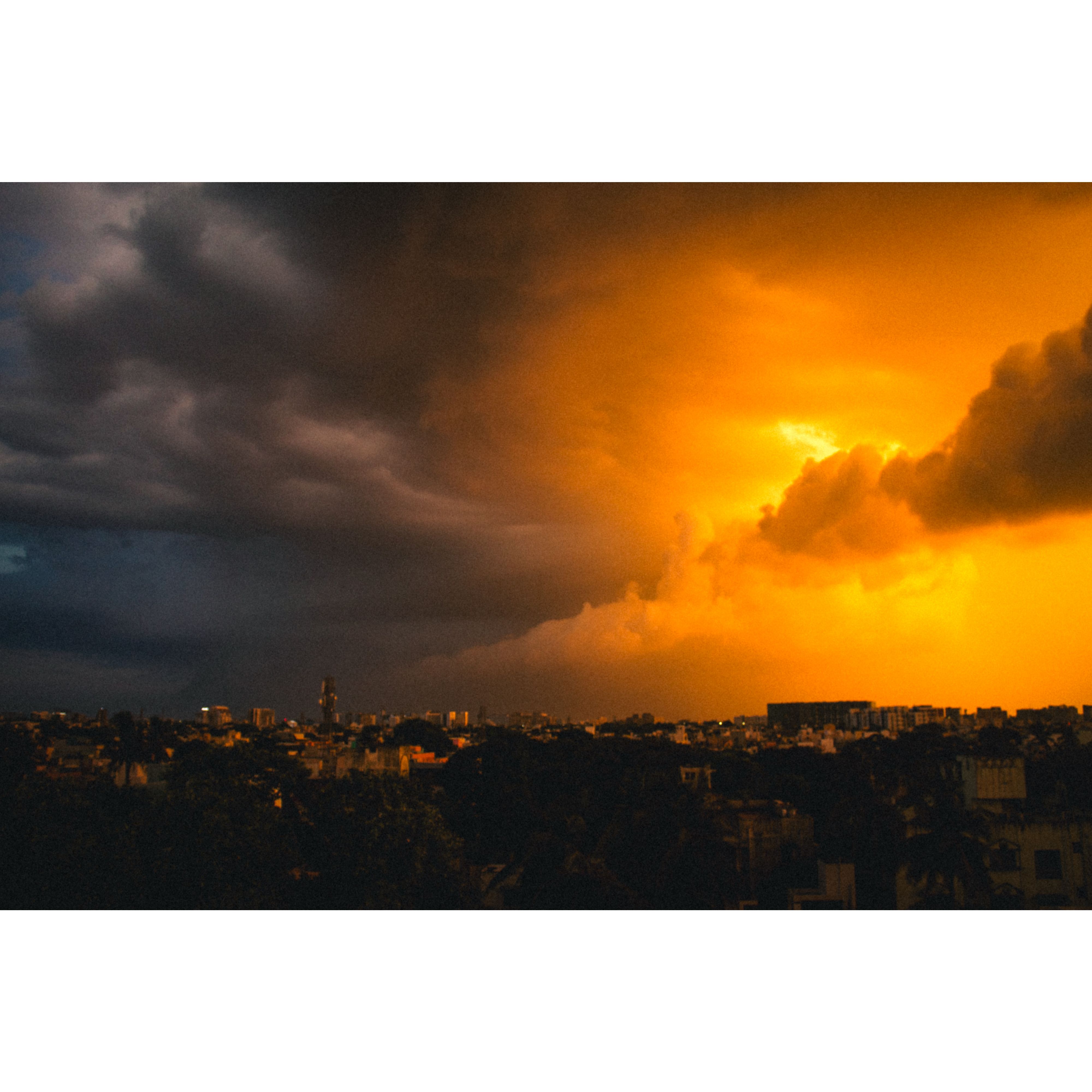 Rain cloud formation during a sunset | Scrolller