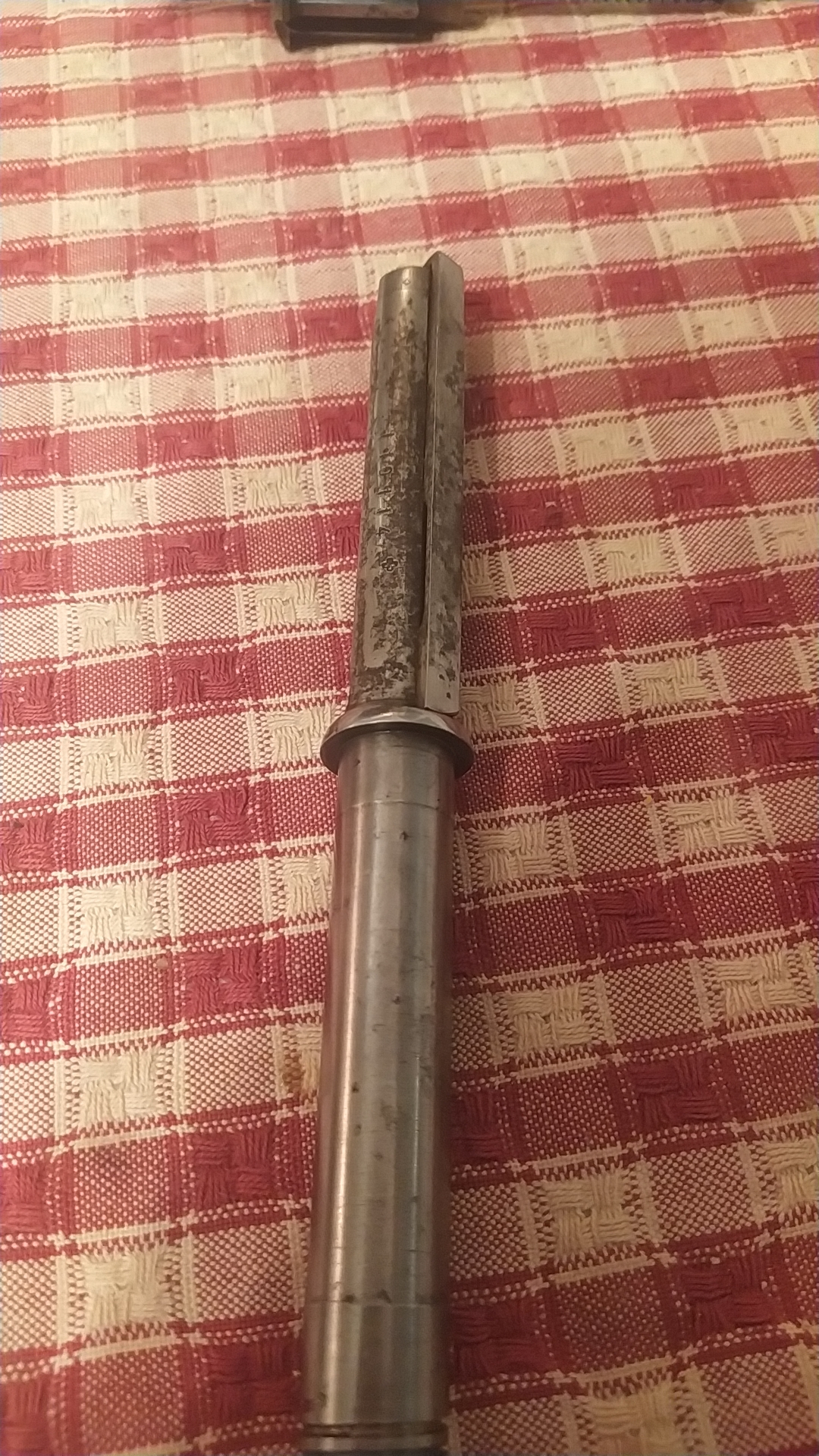 Restoration question, how to remove black spots? | Scrolller