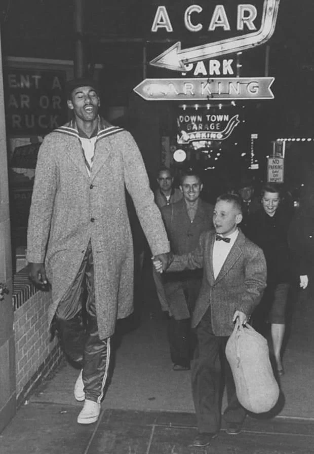 Wilt Chamberlin and son 1960s | Scrolller