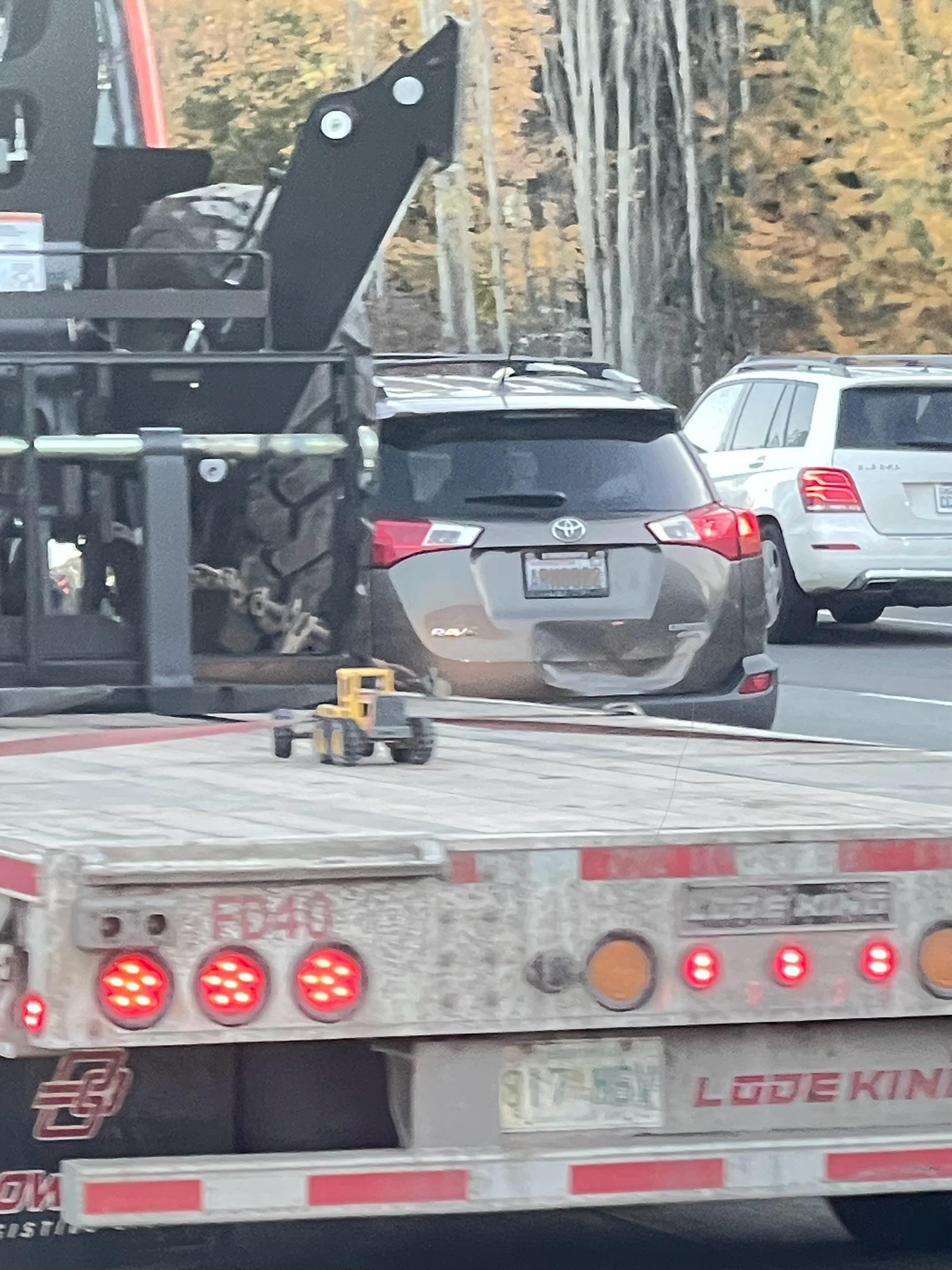 Today saw a Tonka truck tied up on the freeway… | Scrolller