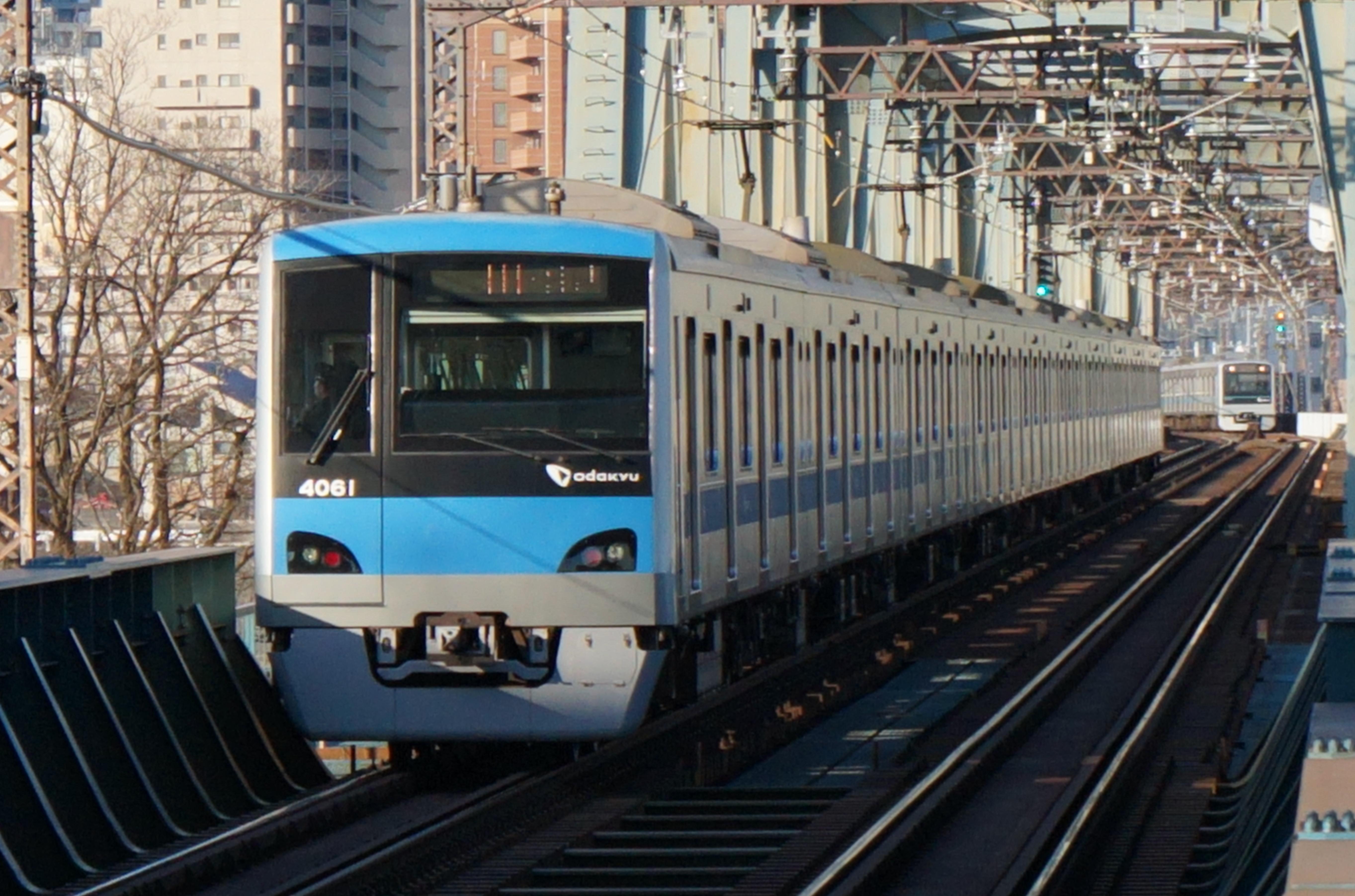 Odakyu set crossing the bridge | Scrolller