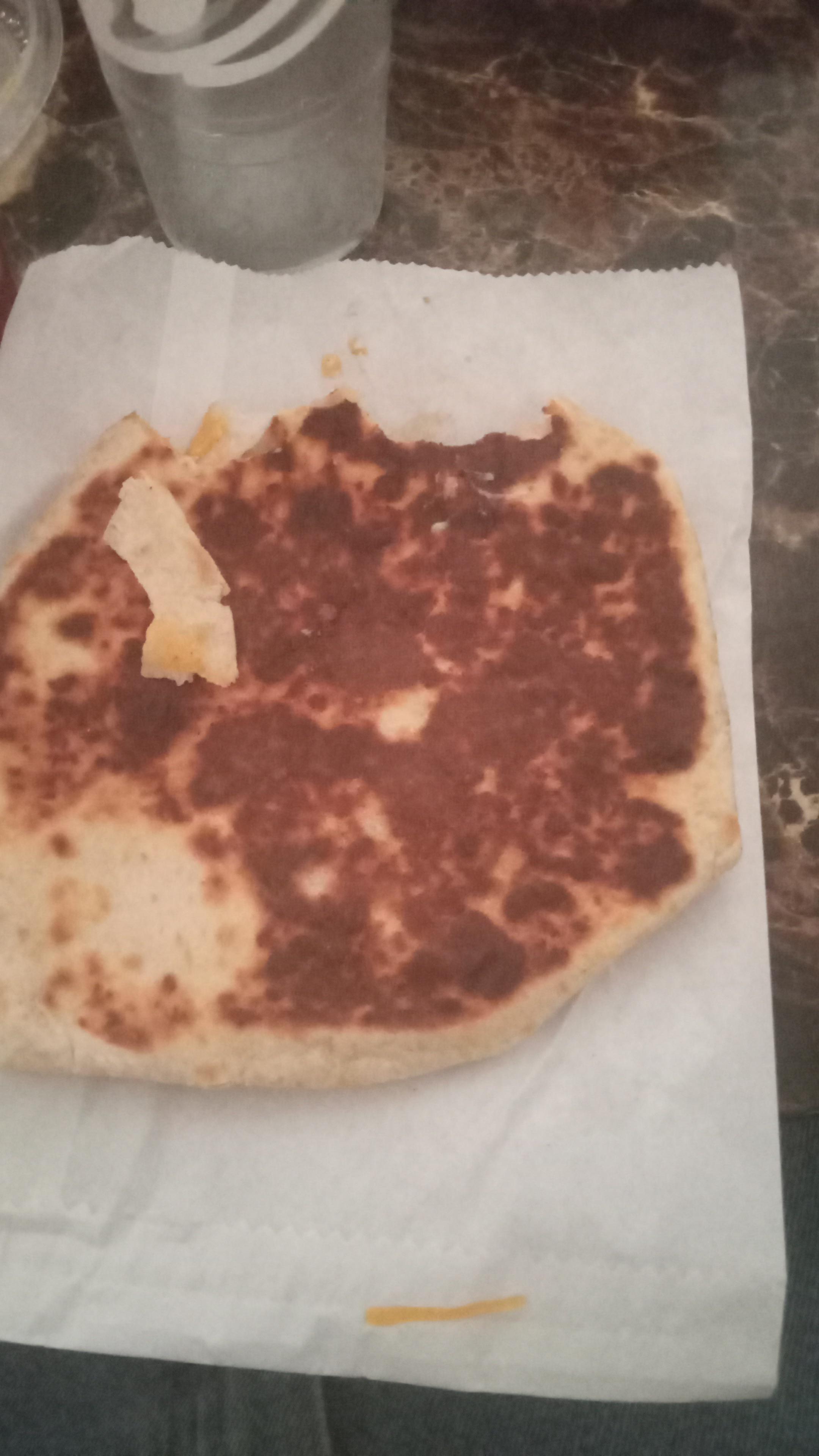 Am I crazy or is this crunch wrap burnt? | Scrolller