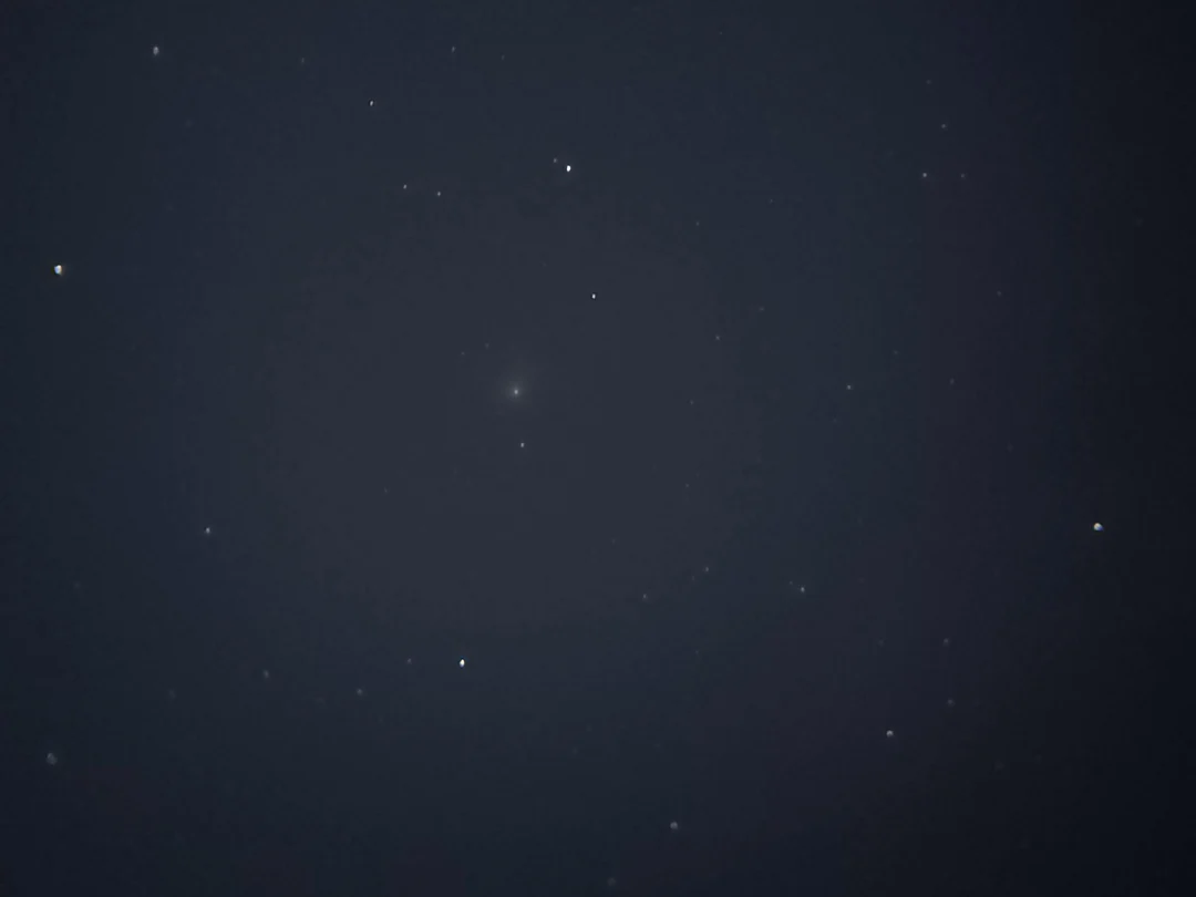 I tried capturing the comet C/2023 E3 (ZTF) with my binoculars and phone | Scrolller