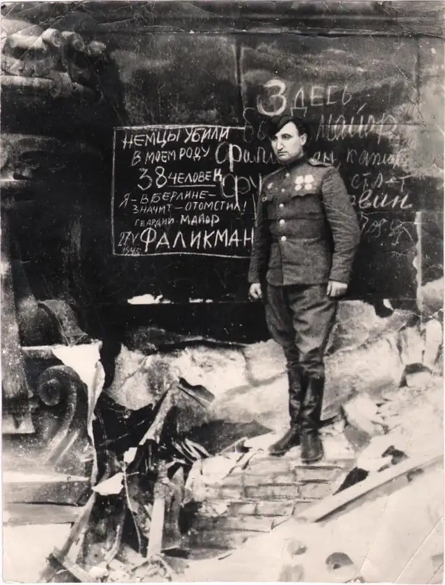 Ihil Shmulevich Falikman at the wall of the Reichstag. Berlin , 1945 . | Scrolller