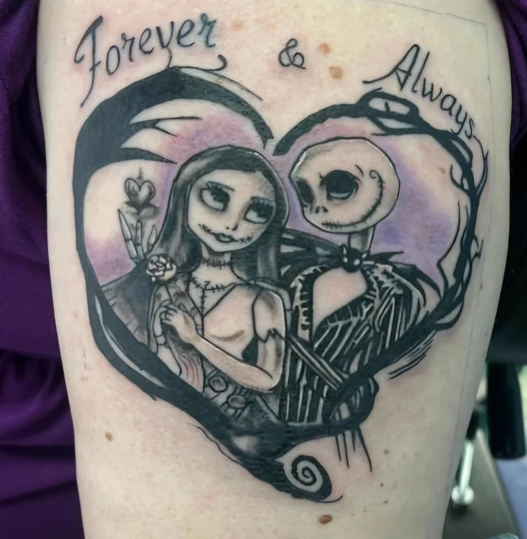 Jack and Sally tattoo done at Next Generation Tattoo in Springfield MO | Scrolller