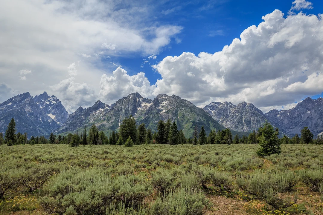 A photo of the Tetons that I took last summer [OC][1920x1080] | Scrolller