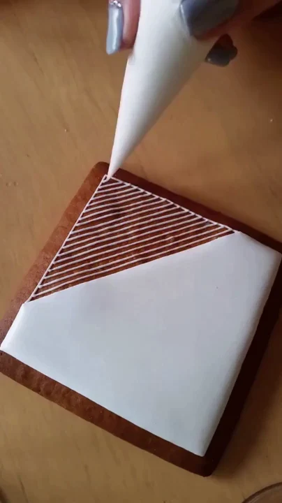 Embroidery style icing on a cookie | Scrolller