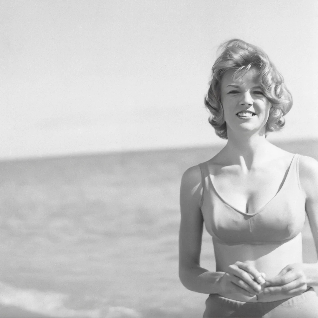 My Mom on a beach somewhere in Florida while on vacation in December 1963. | Scrolller