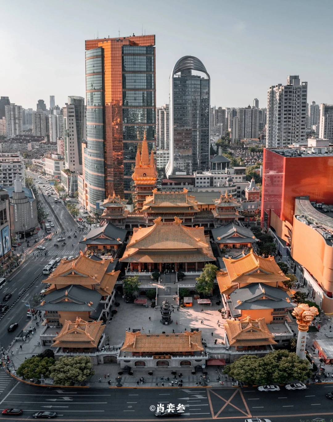 The old and the new. Jing'an Temple, Shanghai. | Scrolller