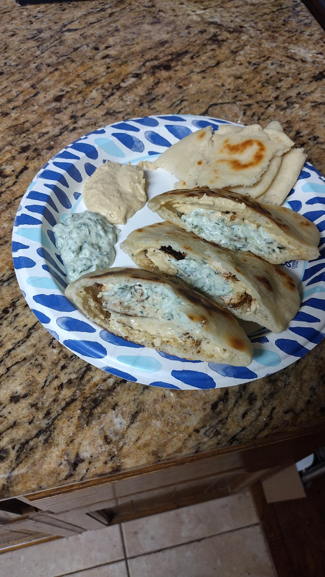 Homemade Chicken Pita Pockets with Hummus and Tzatziki | Scrolller