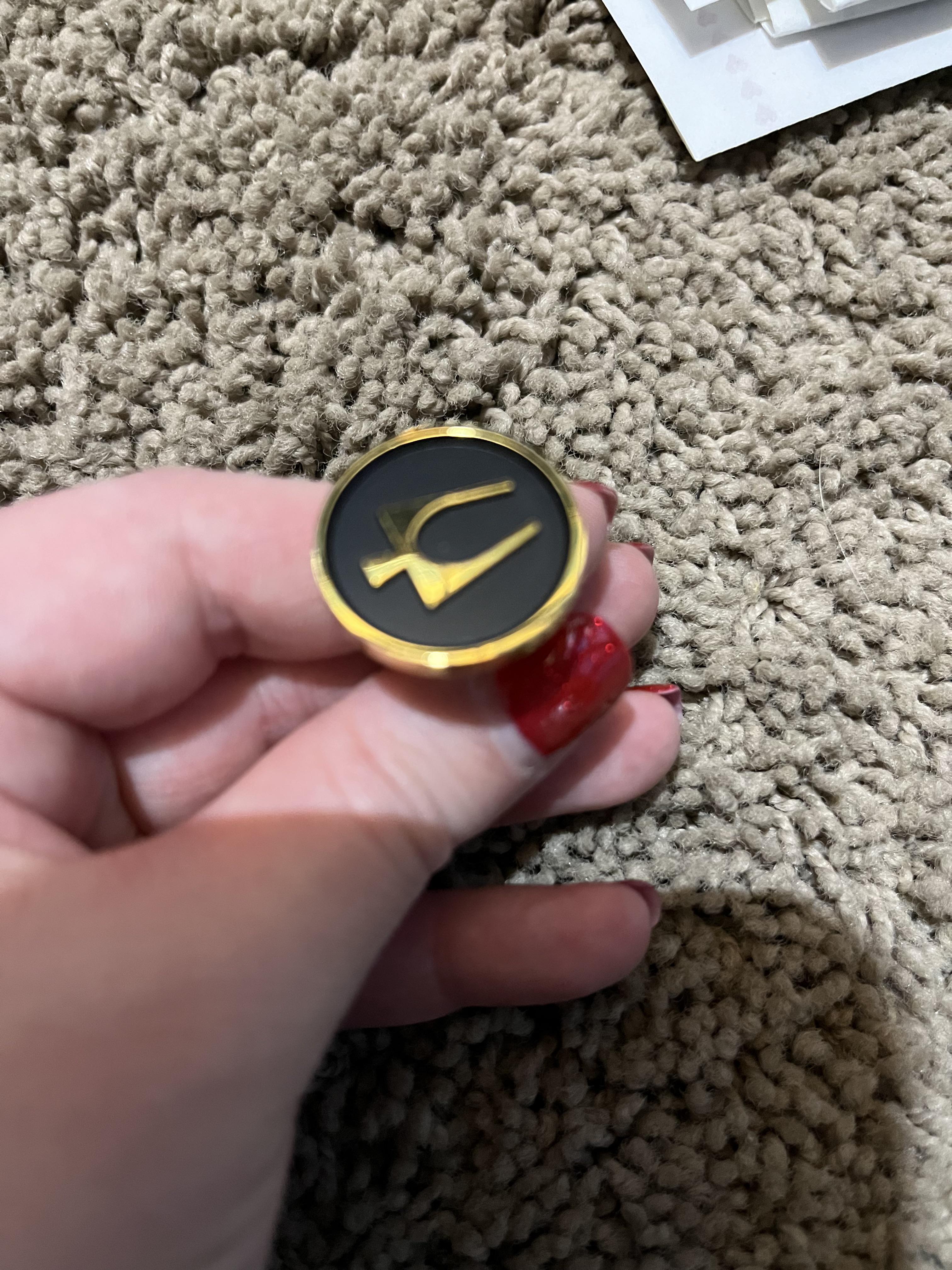Cuff links-what is this symbol? | Scrolller