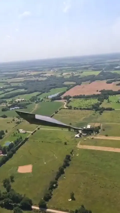 B-2 Spirit stealth bomber and T-38 Talons conducting a flyover during the 2024 Wings Over ...