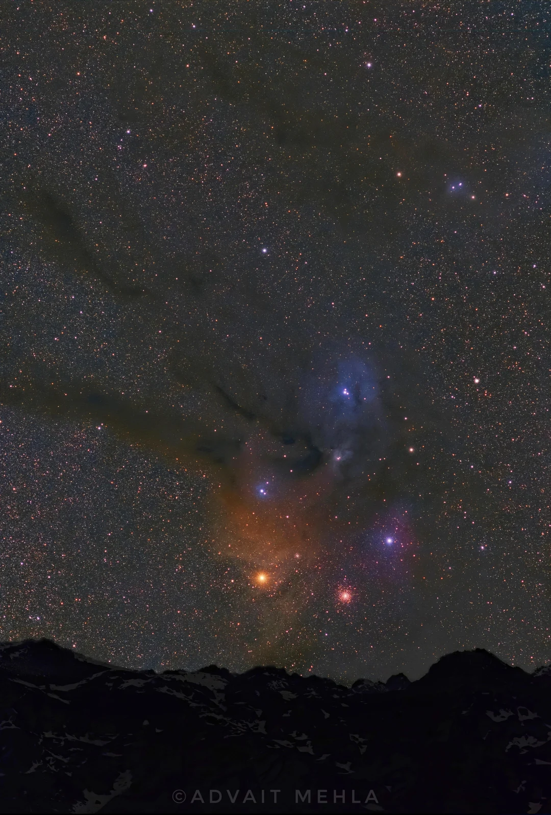 Some nebulae are pretty huge in the night sky. Here are the clouds of Rho Ophiuchi setting over ...