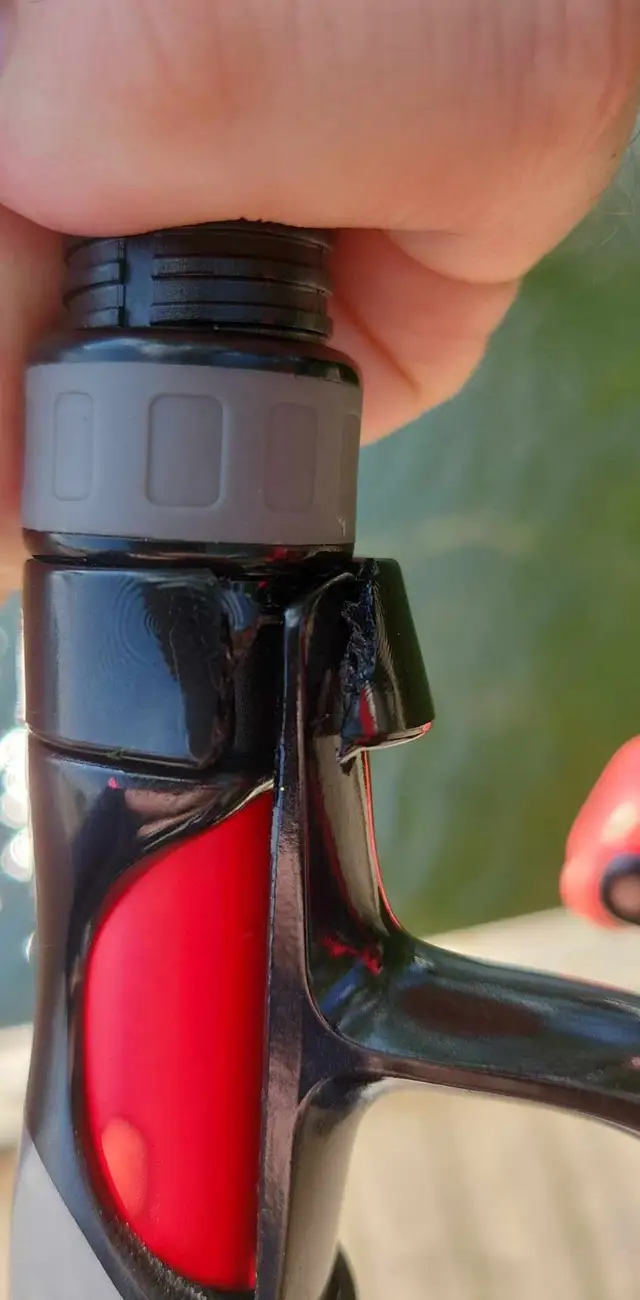 Any way to fix this break in the reel holder, other than electrical tape? | Scrolller