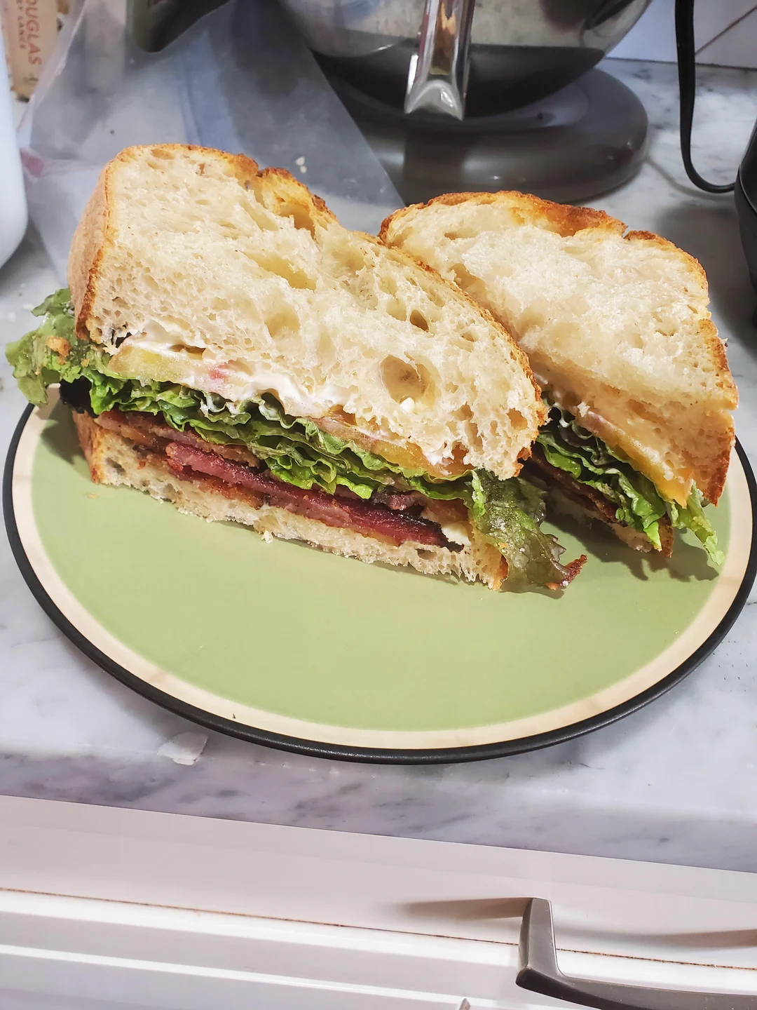 Don't mess with the classic BLT. Pepper bacon, heirloom tomato, red leaf on sourdough boule ...