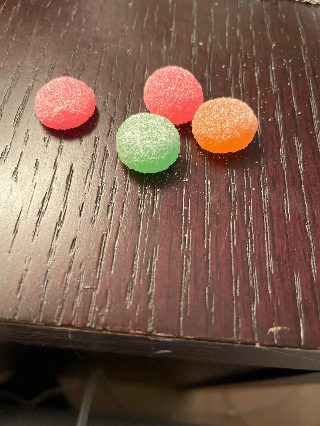 What are these called? Disc shaped, sugar coated and chewy. | Scrolller