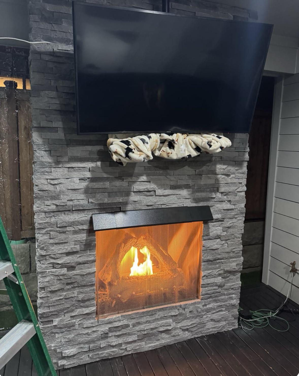 Heat barrier ideas for TV above fireplace | Scrolller
