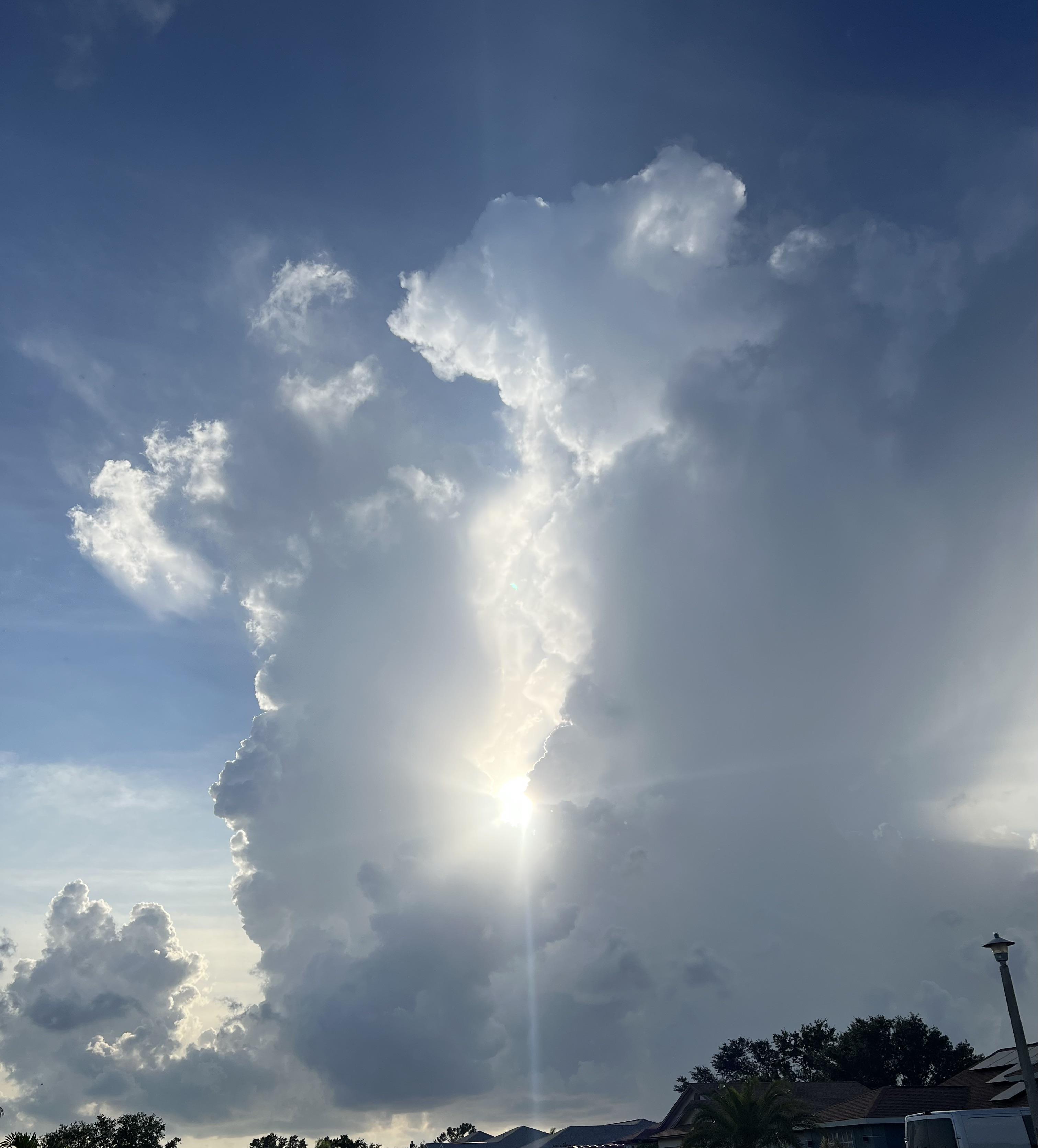 The sun peering through storm clouds yesterday | Scrolller