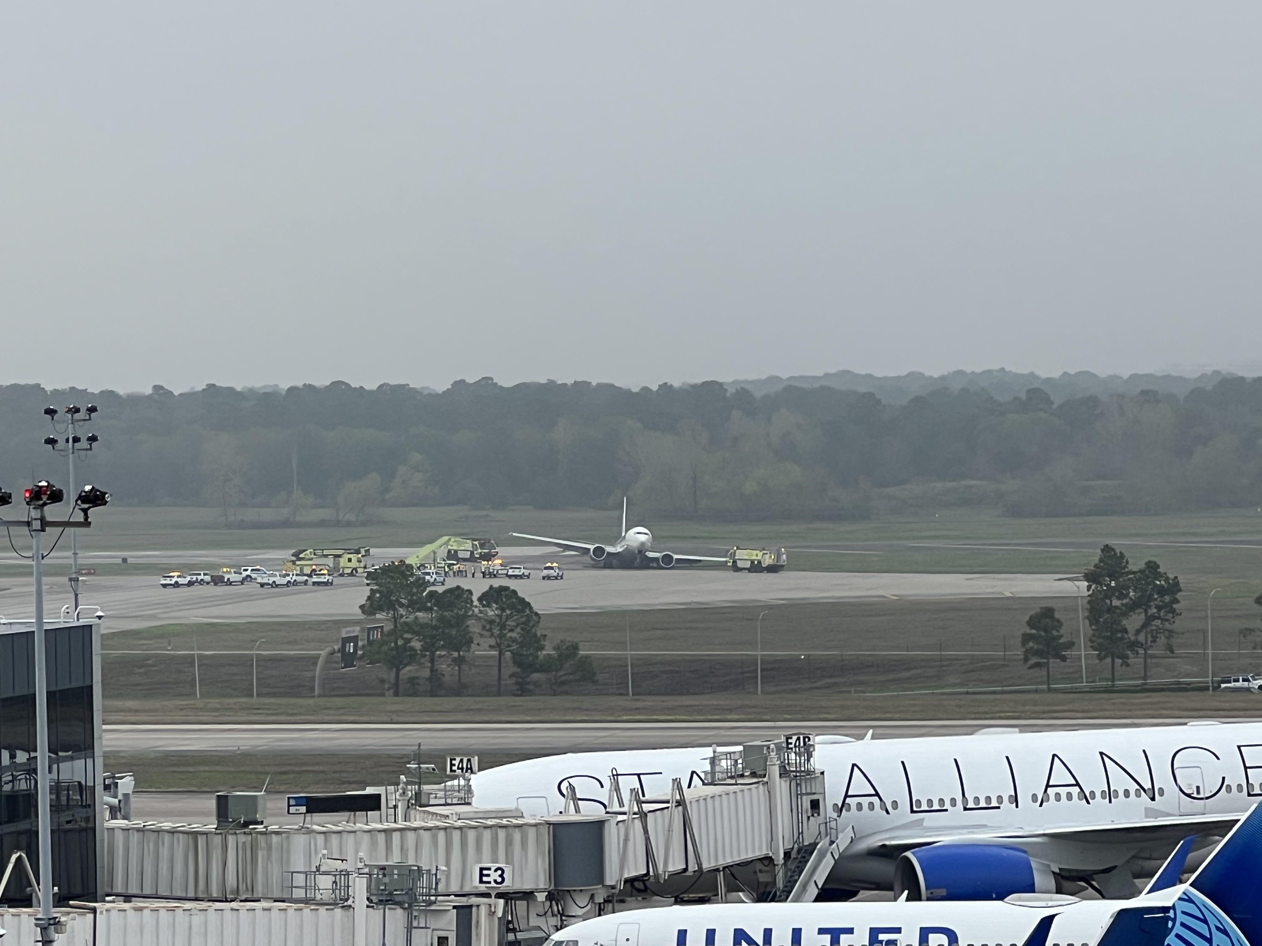 Plane slid off the runway at IAH this morning. | Scrolller