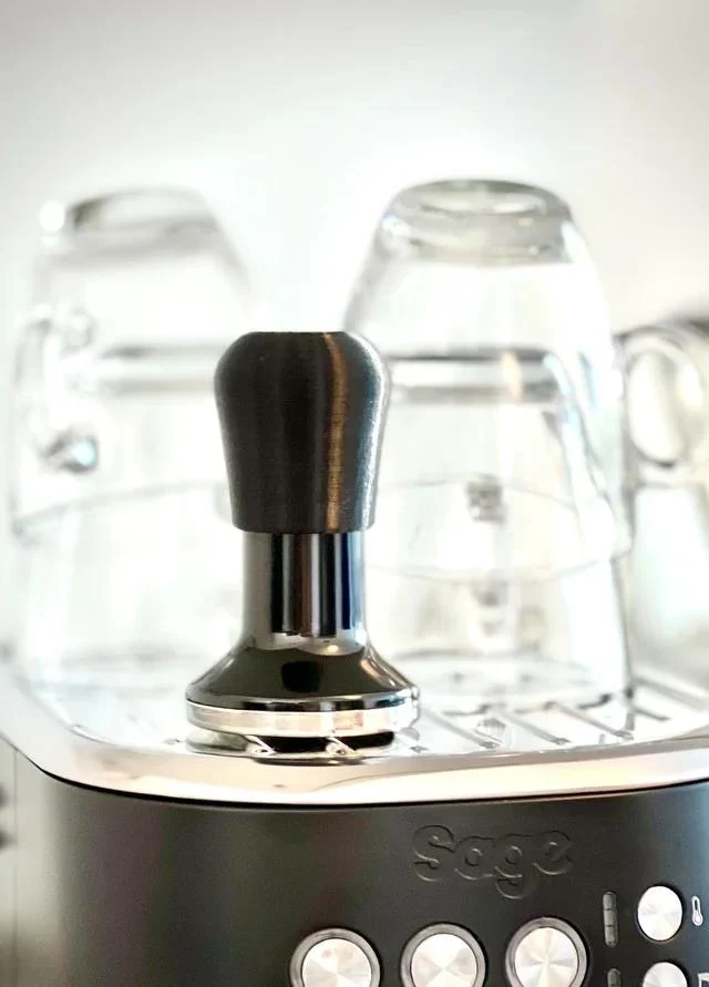 Added an extension to the tamper that came with my espresso machine. Comfort has improved a lot ...