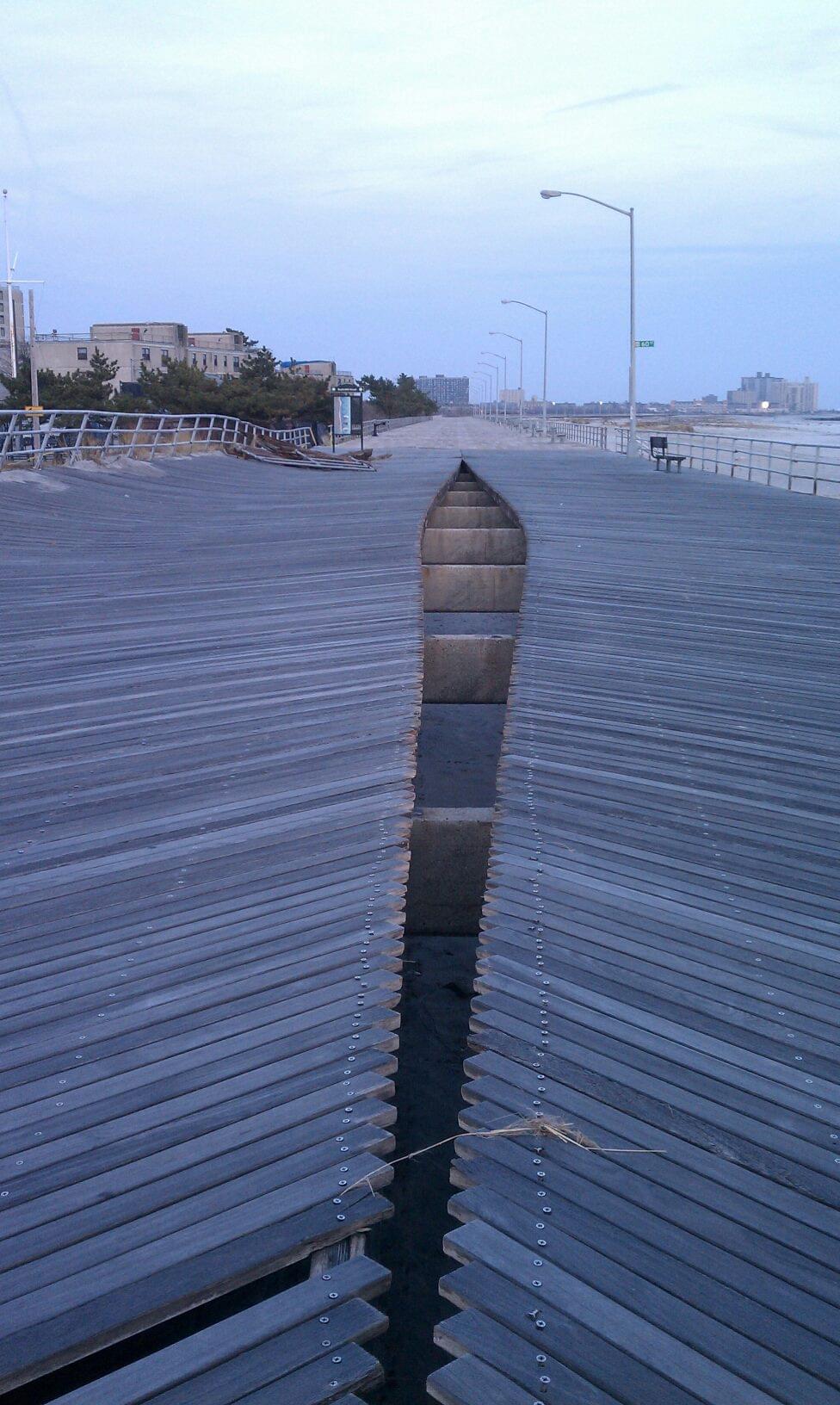 Discover more like Interestingasfuck: Super Storm Sandy: Beach 60th Street split like a zipper ...
