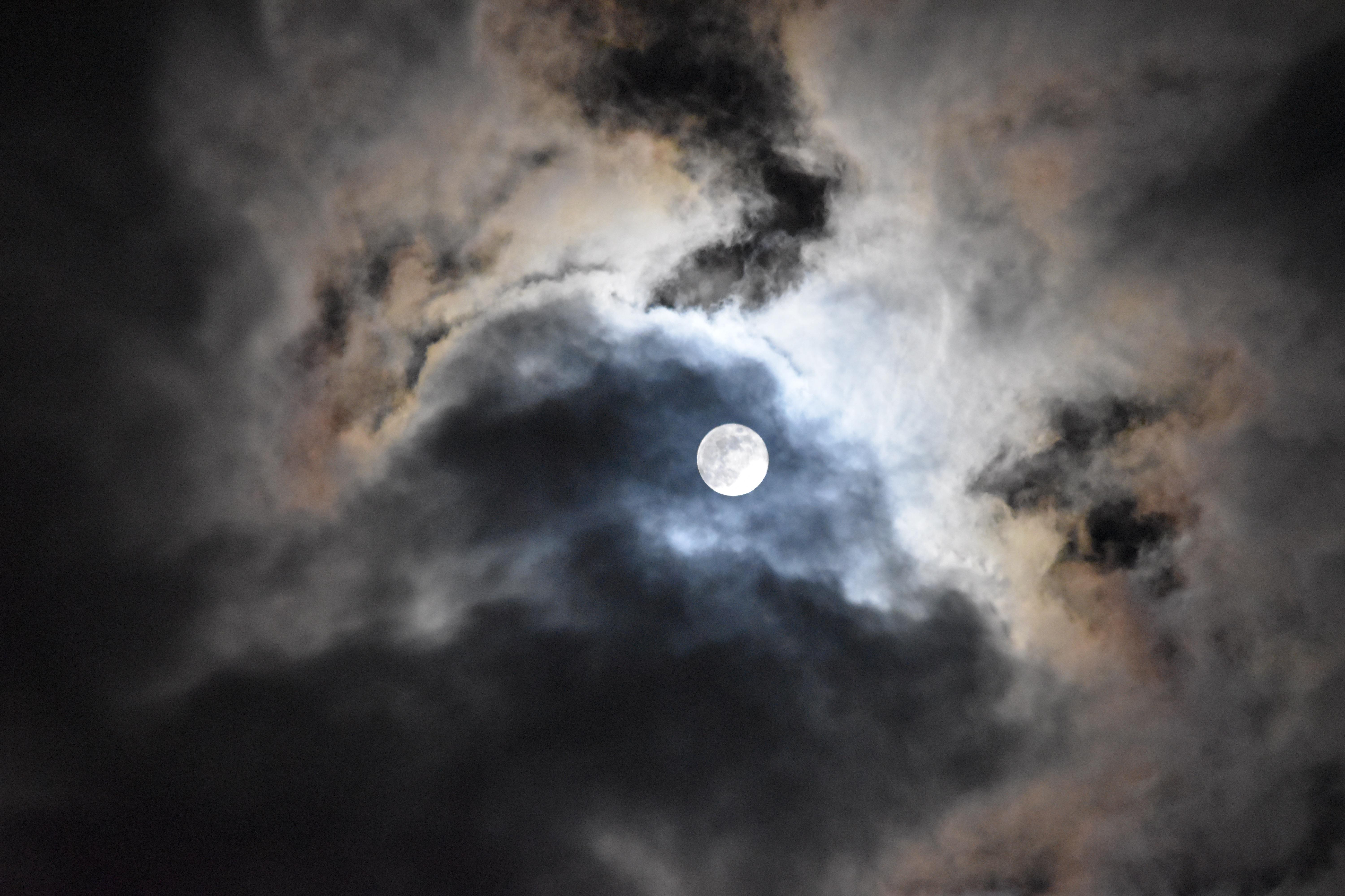 Full moon sailing through the clouds over Cape Cod | Scrolller