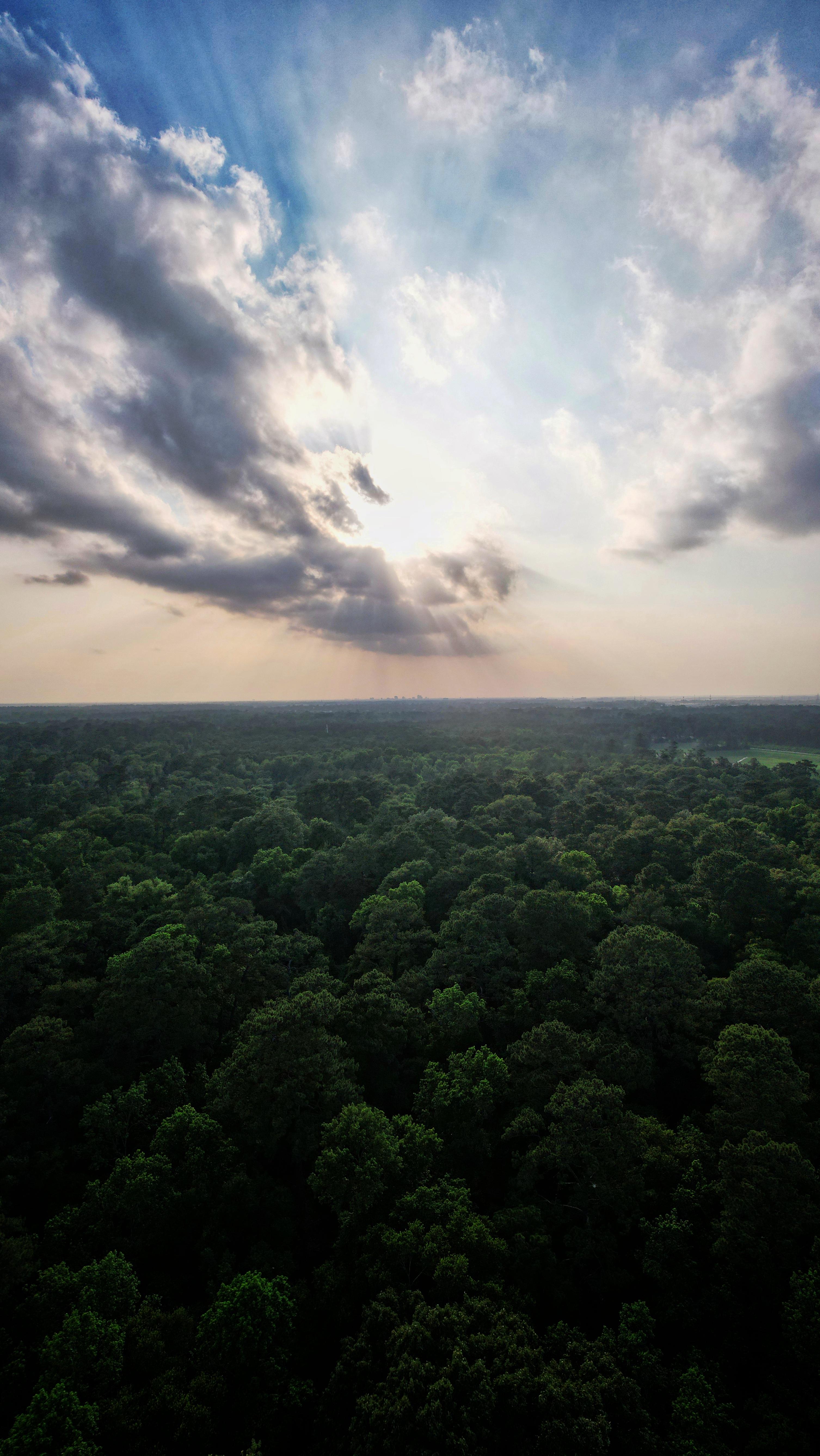 Clouds Holding The Sun [OC] | Scrolller