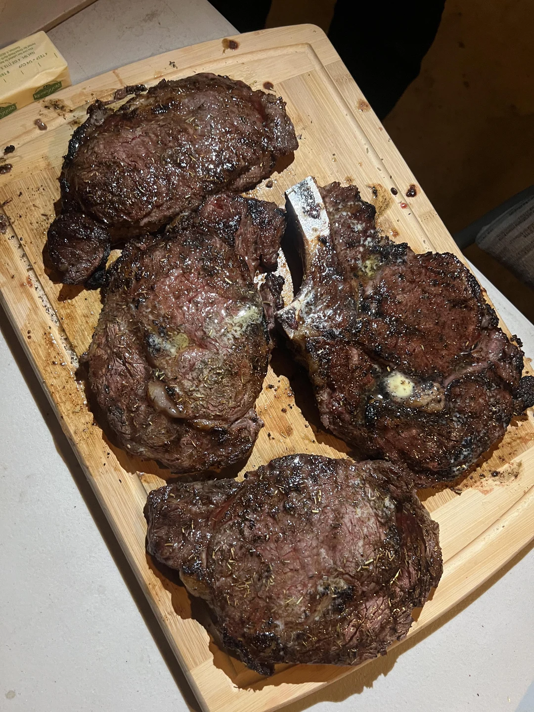 First time making buttery steaks on charcoal. | Scrolller