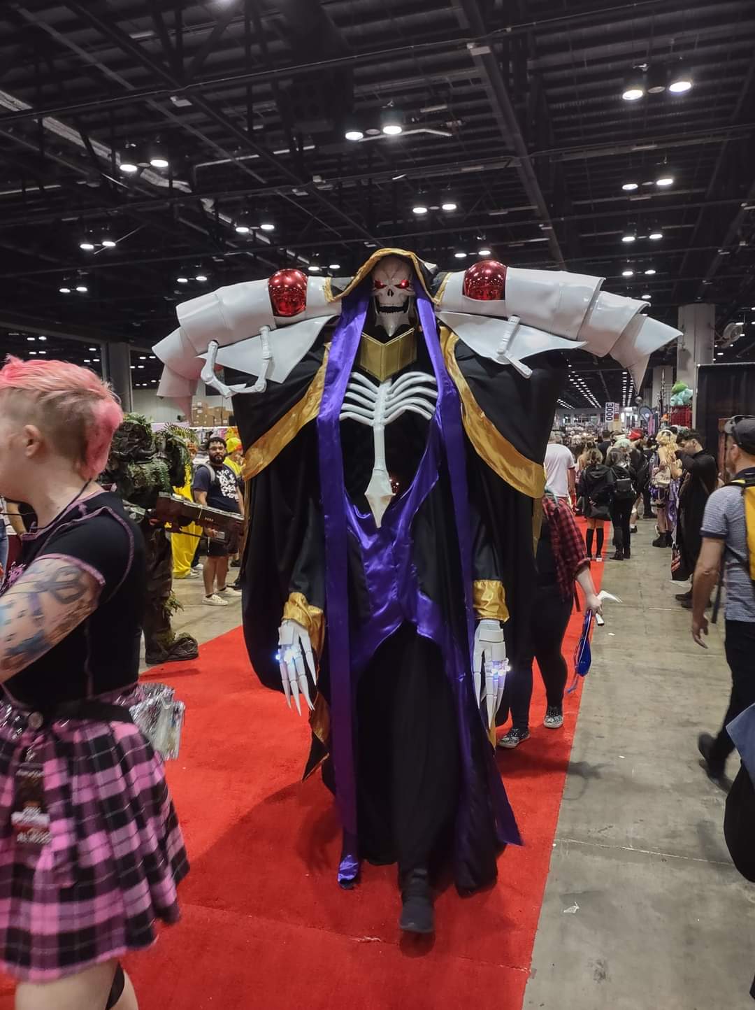 Here are a couple photos of my lord ainz and my wife's shaltear from this years megacon ...