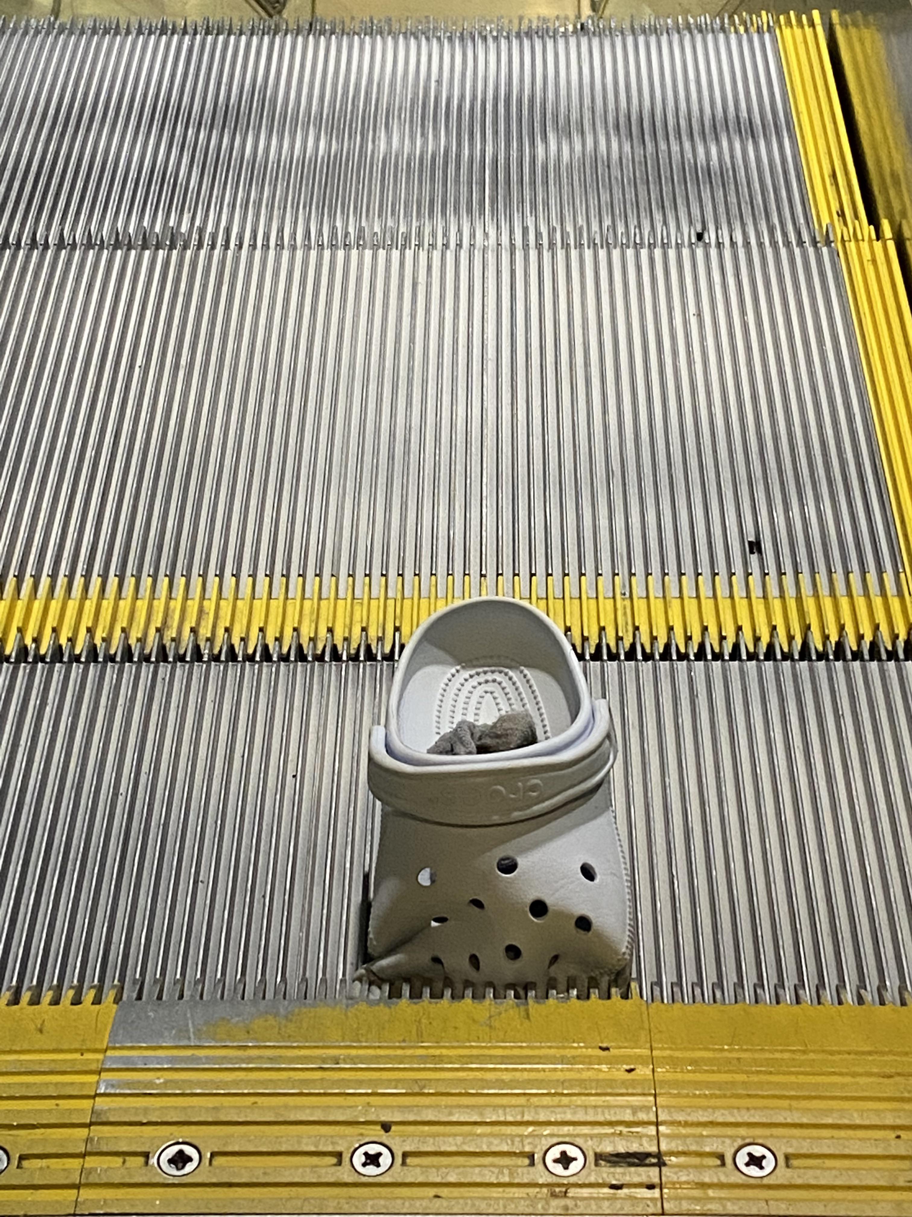 Crocs on an escalator | Scrolller