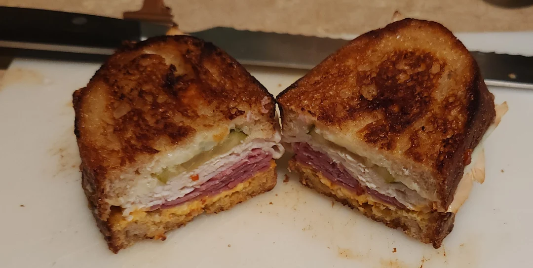 Turkey, salami, hot pepper spread, and pickles on homemade sourdough | Scrolller