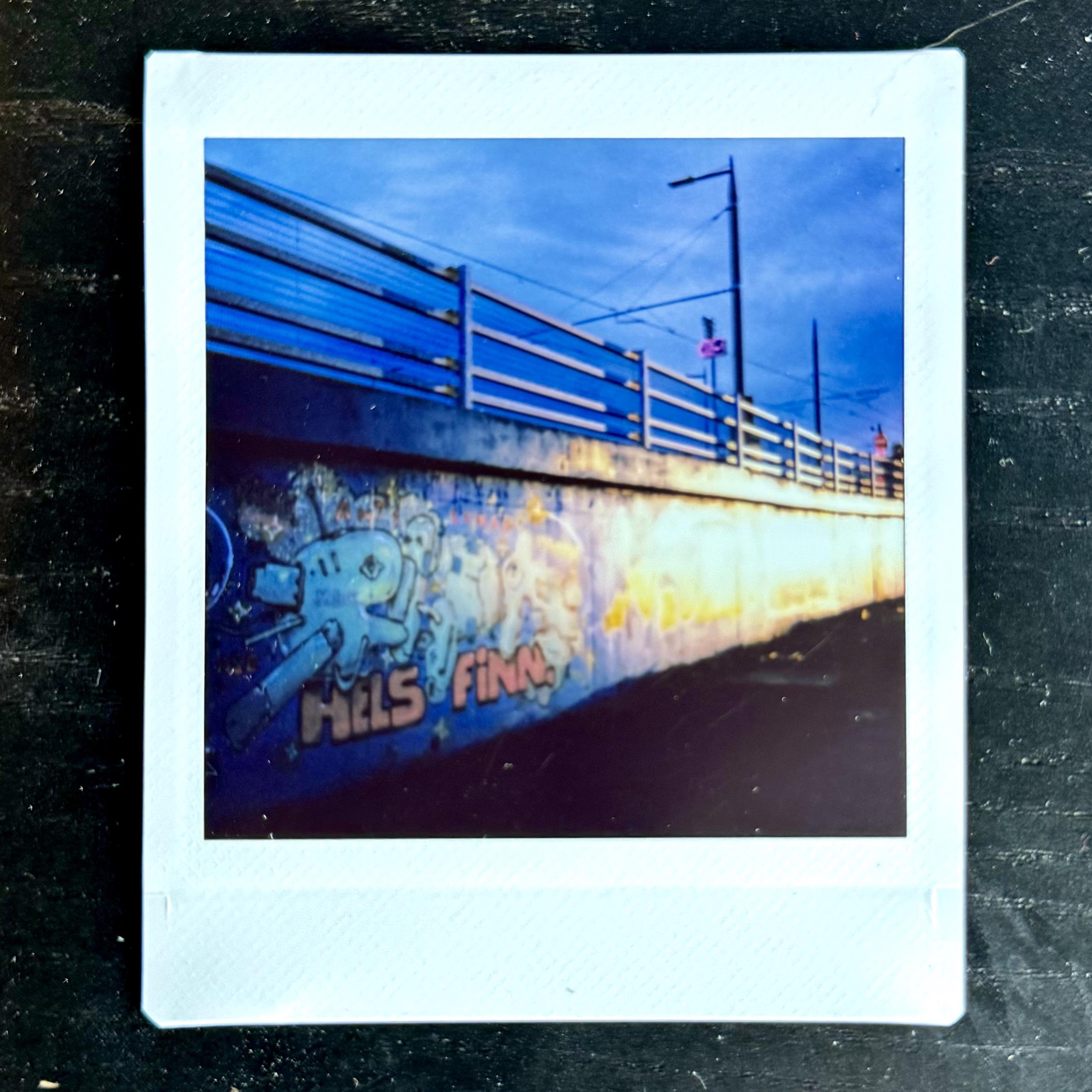 Graffiti wall at sunset | Scrolller