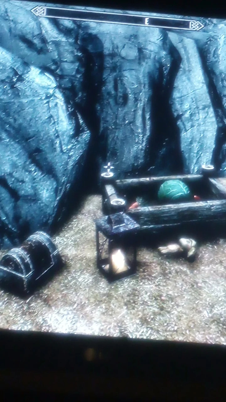 what is this strongbox and how can i open it? it is on the left side of dragons reach. | Scrolller