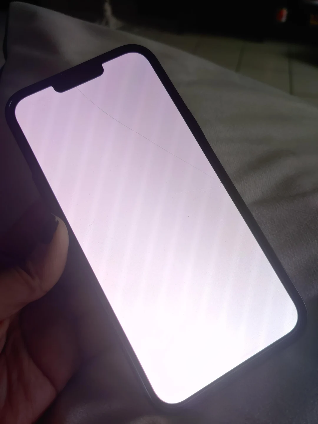 iPhone 13 Pro Max stuck on White screen, I have not dropped it and warranty just ended. Tried ...