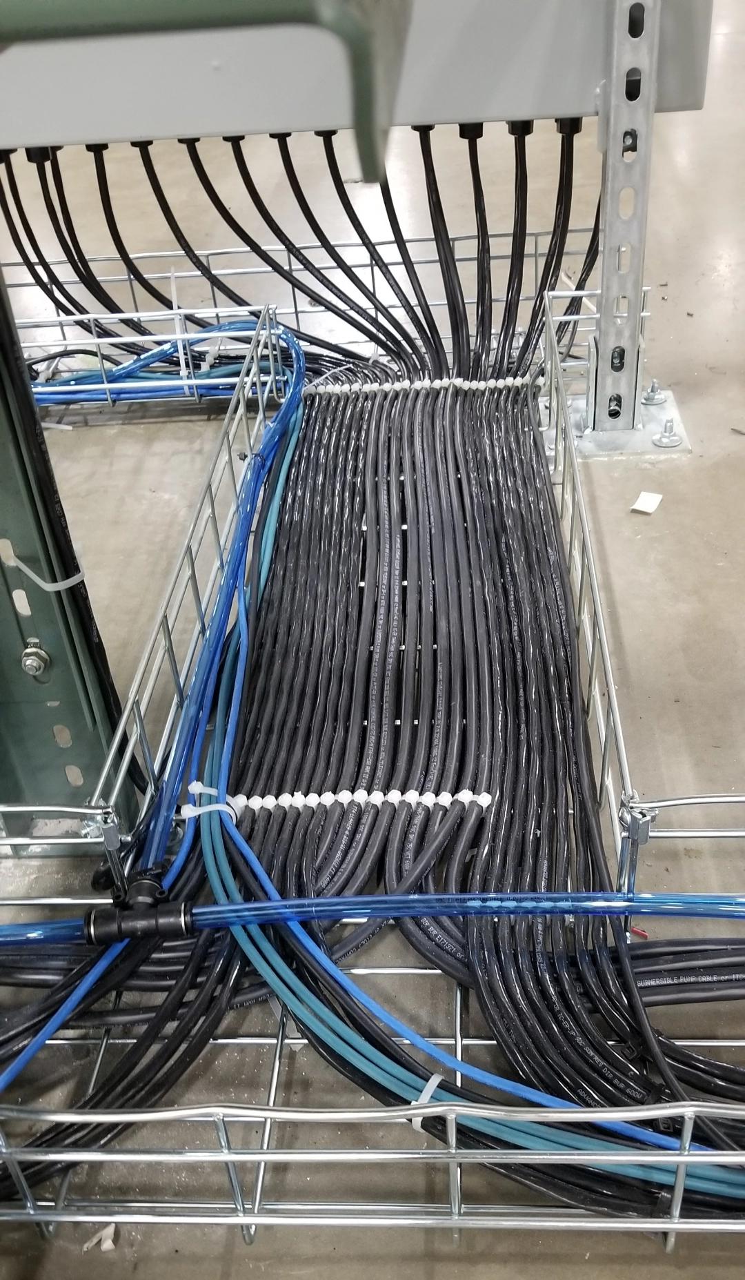 This cable management under the new conveyor at my work. | Scrolller