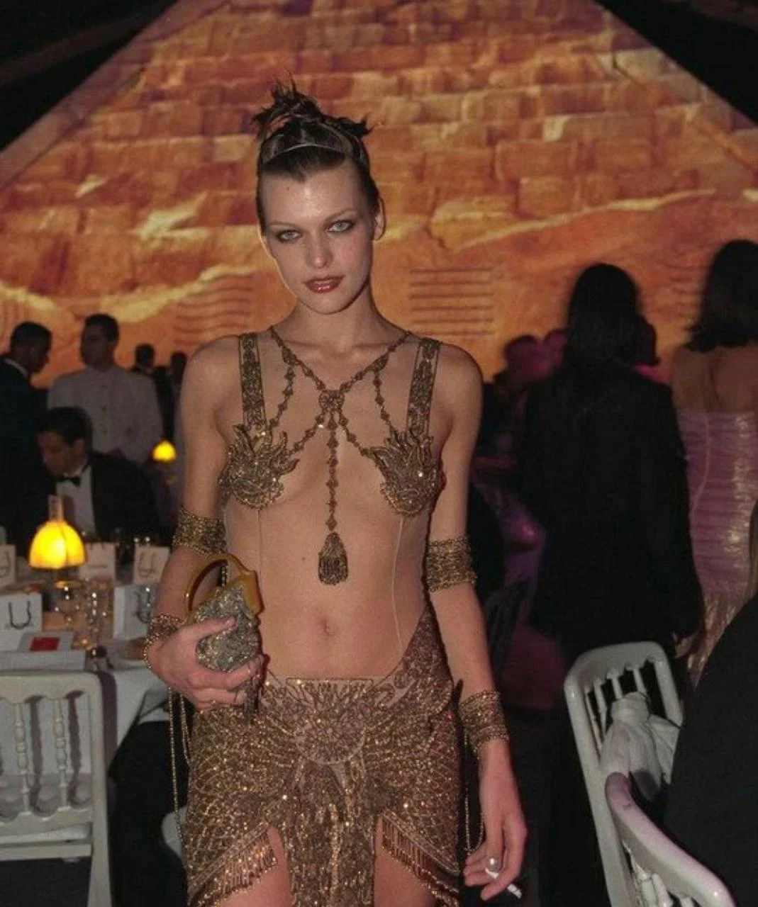Mila Jovovich at the premiere of the Fifth Element, 1997 | Scrolller