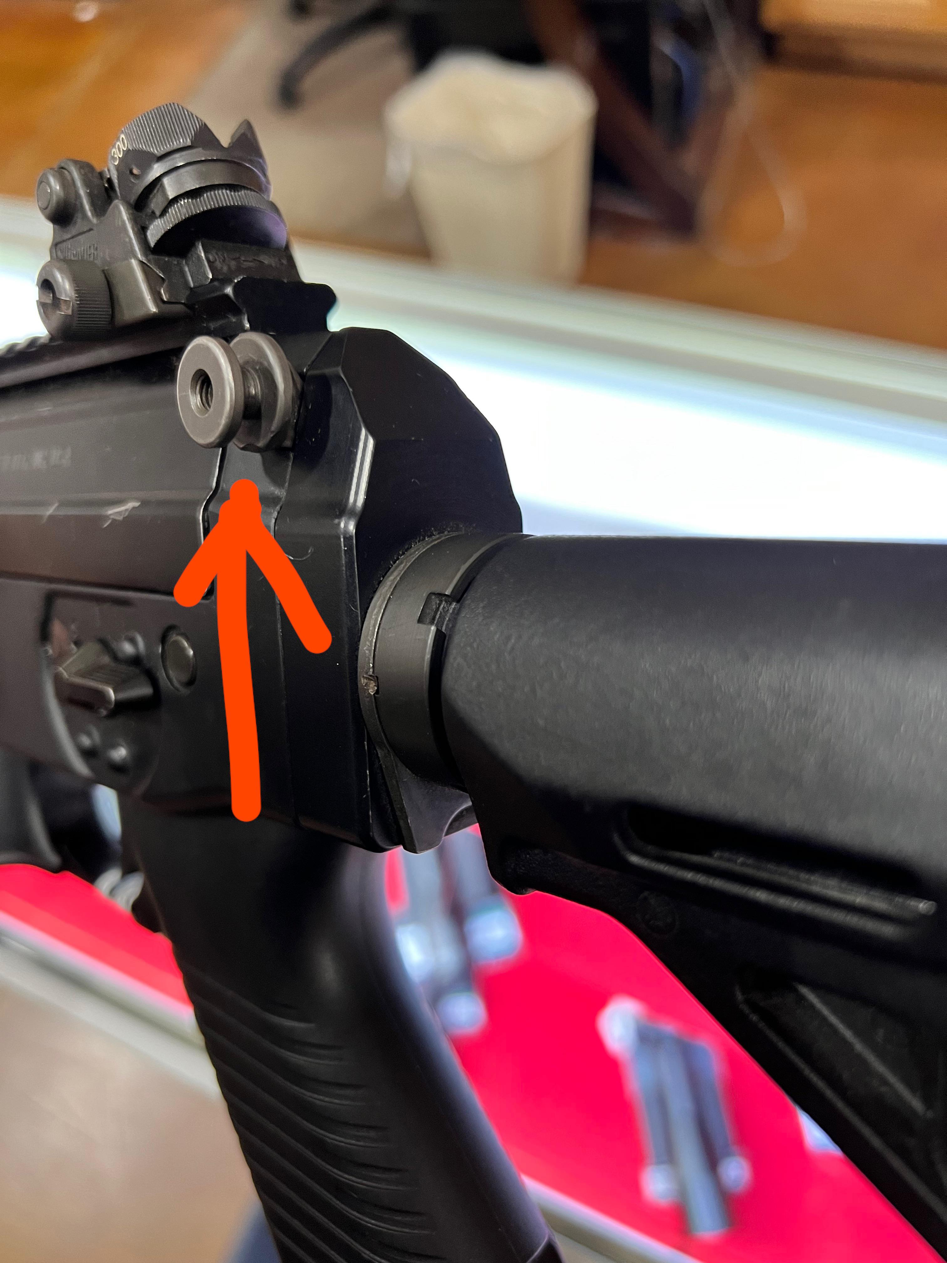 Need help identifying obscure sling attachment point on an LEO trade in Sig 556 factory SBR ...