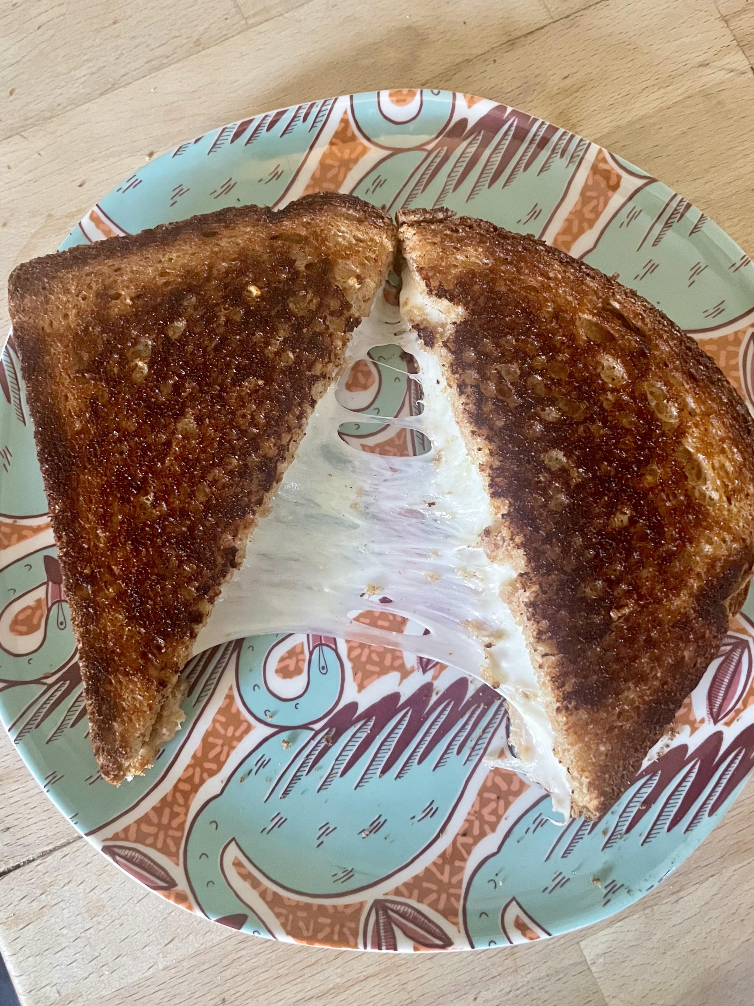 Muenster on whole wheat with an awesome cheese pull. | Scrolller
