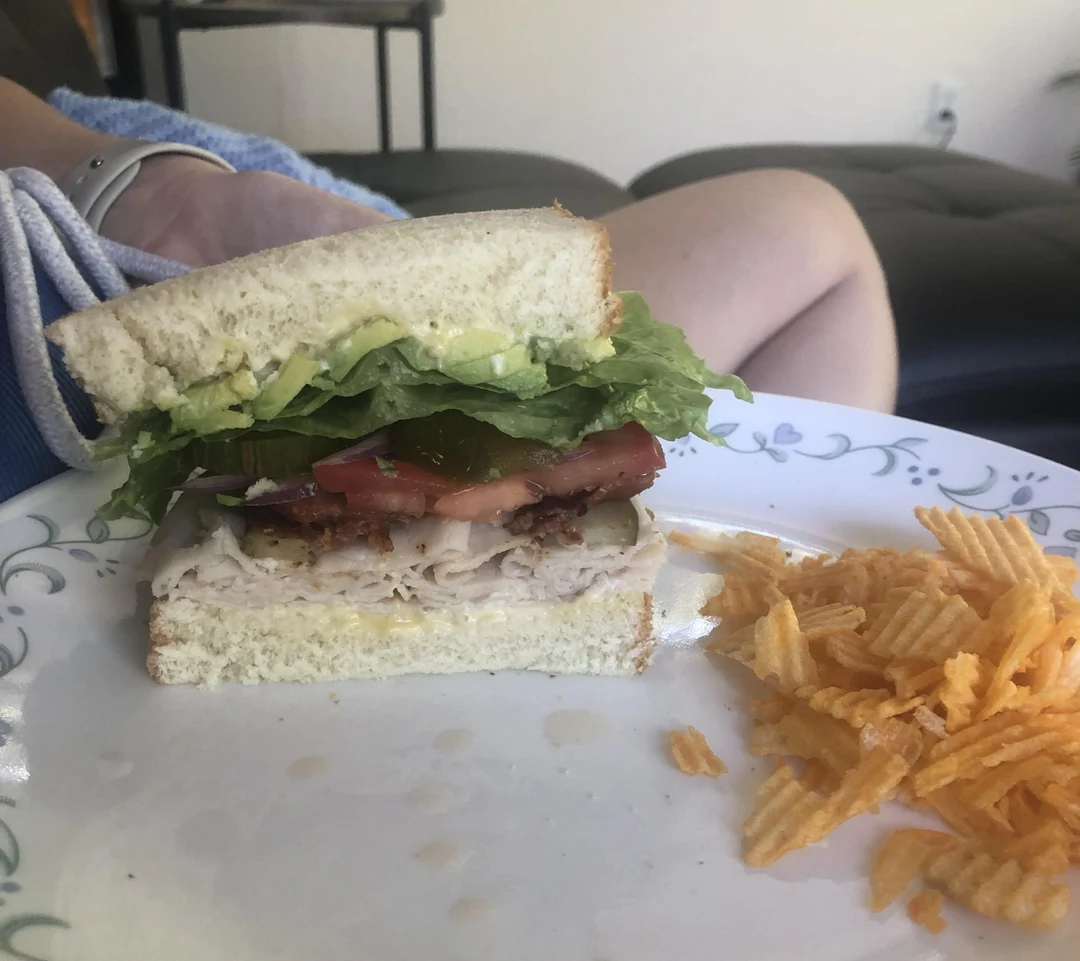 Bakery bread with honey mustard and Mayo, turkey, bacon, pickle, tomato, jalapeño, romaine, and ...