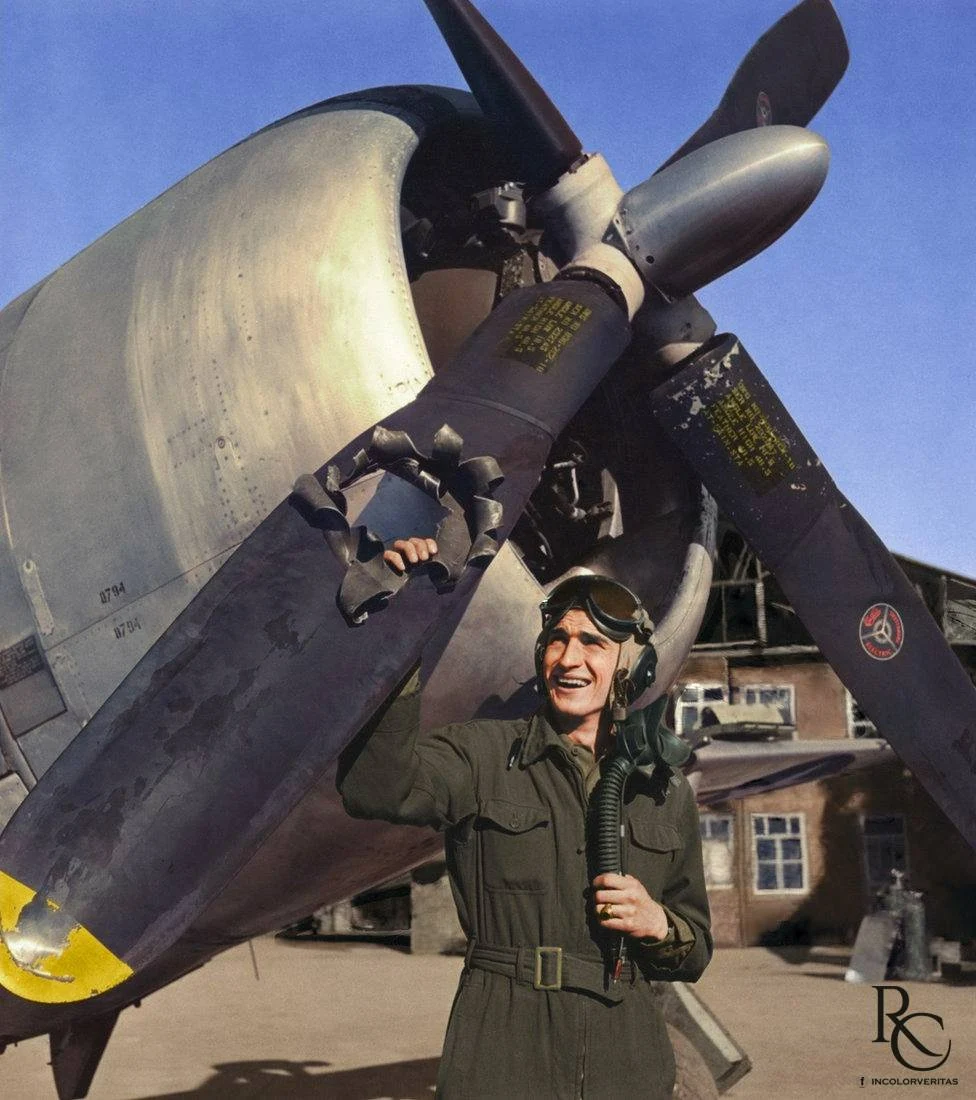 Edwin Wright shows off the damage to his P-47 Thunderbolt, October 1944 | Scrolller