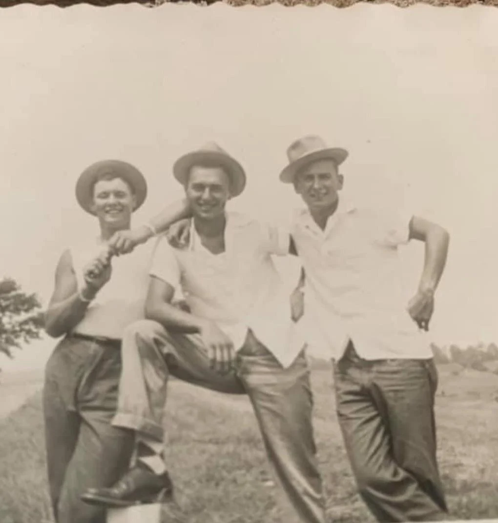An unnamed man, my grandpa, and great uncle. East Tennessee, 1955. | Scrolller