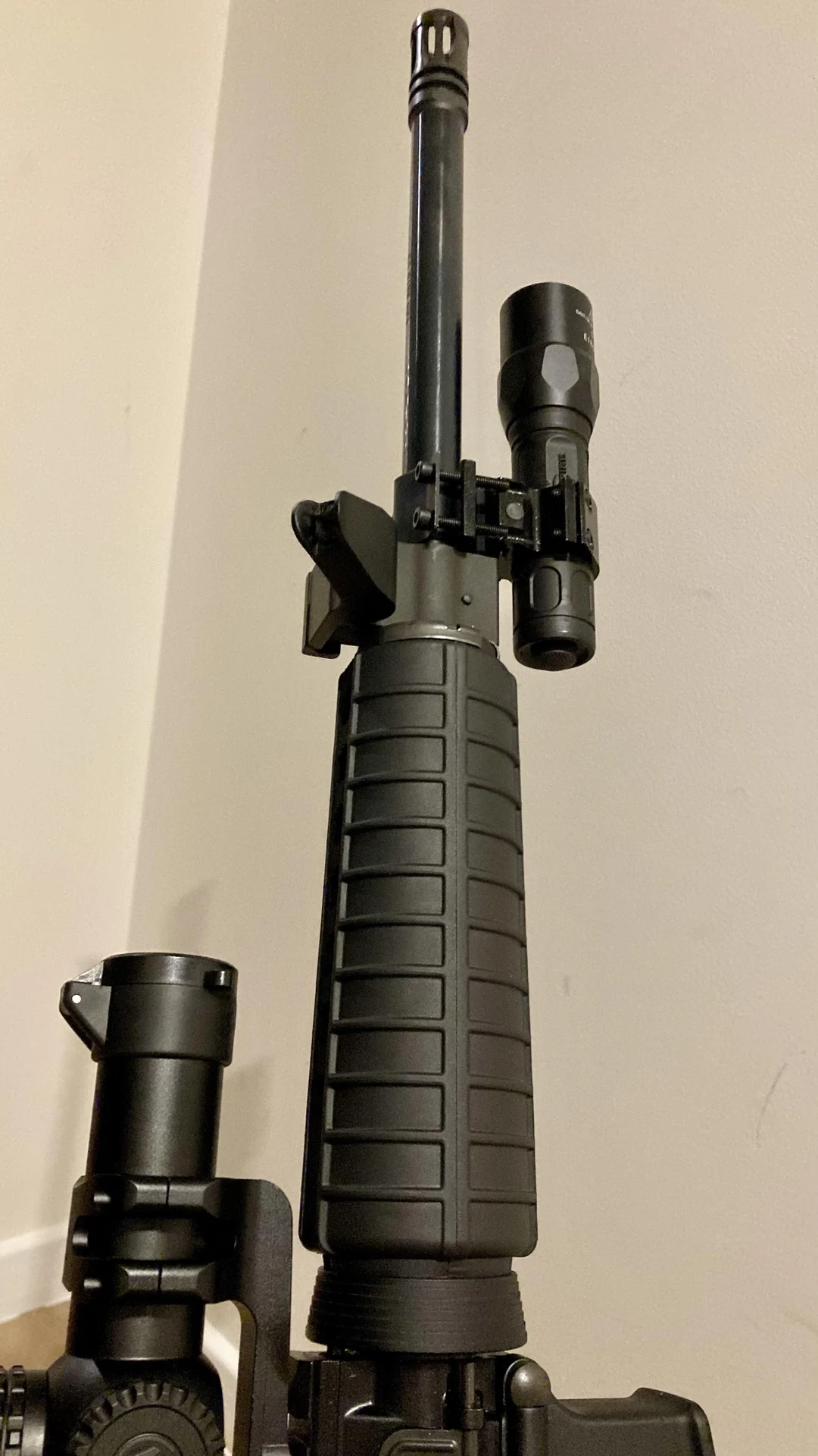 What are your experiences regarding barrel-clamp flashlight mounts? | Scrolller